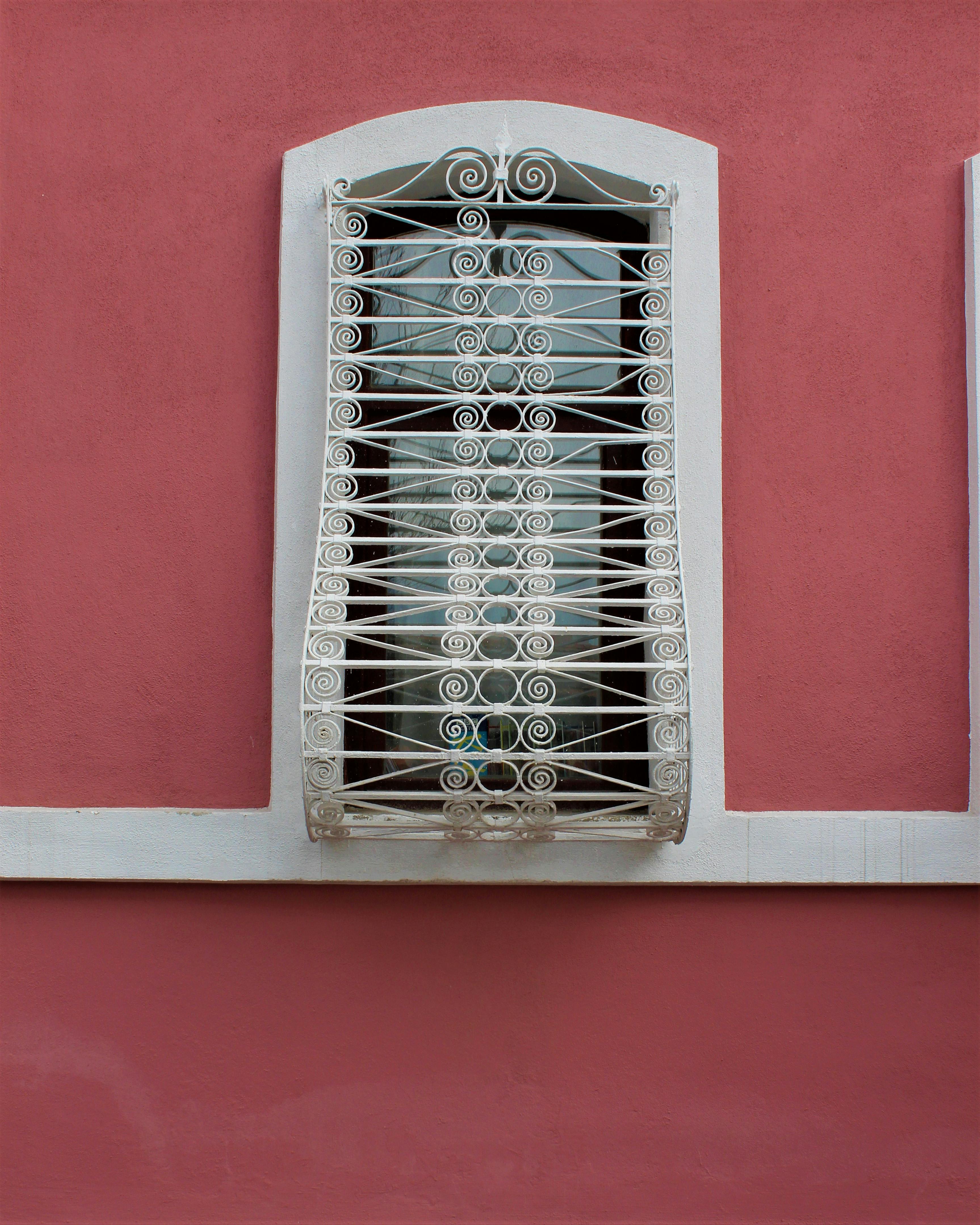 Bars and Barbed Wire on Window · Free Stock Photo