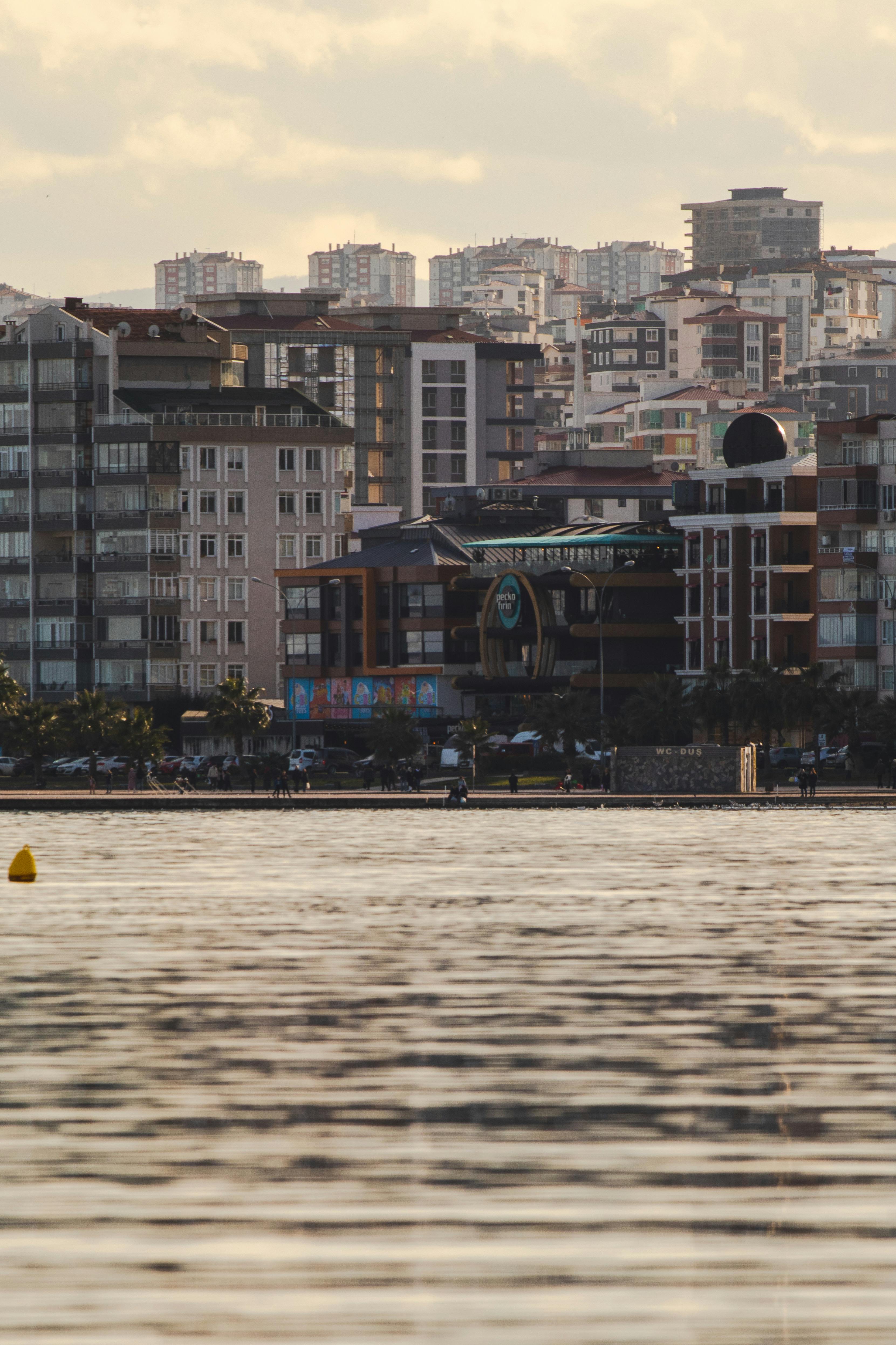 City Buildings on Shore · Free Stock Photo