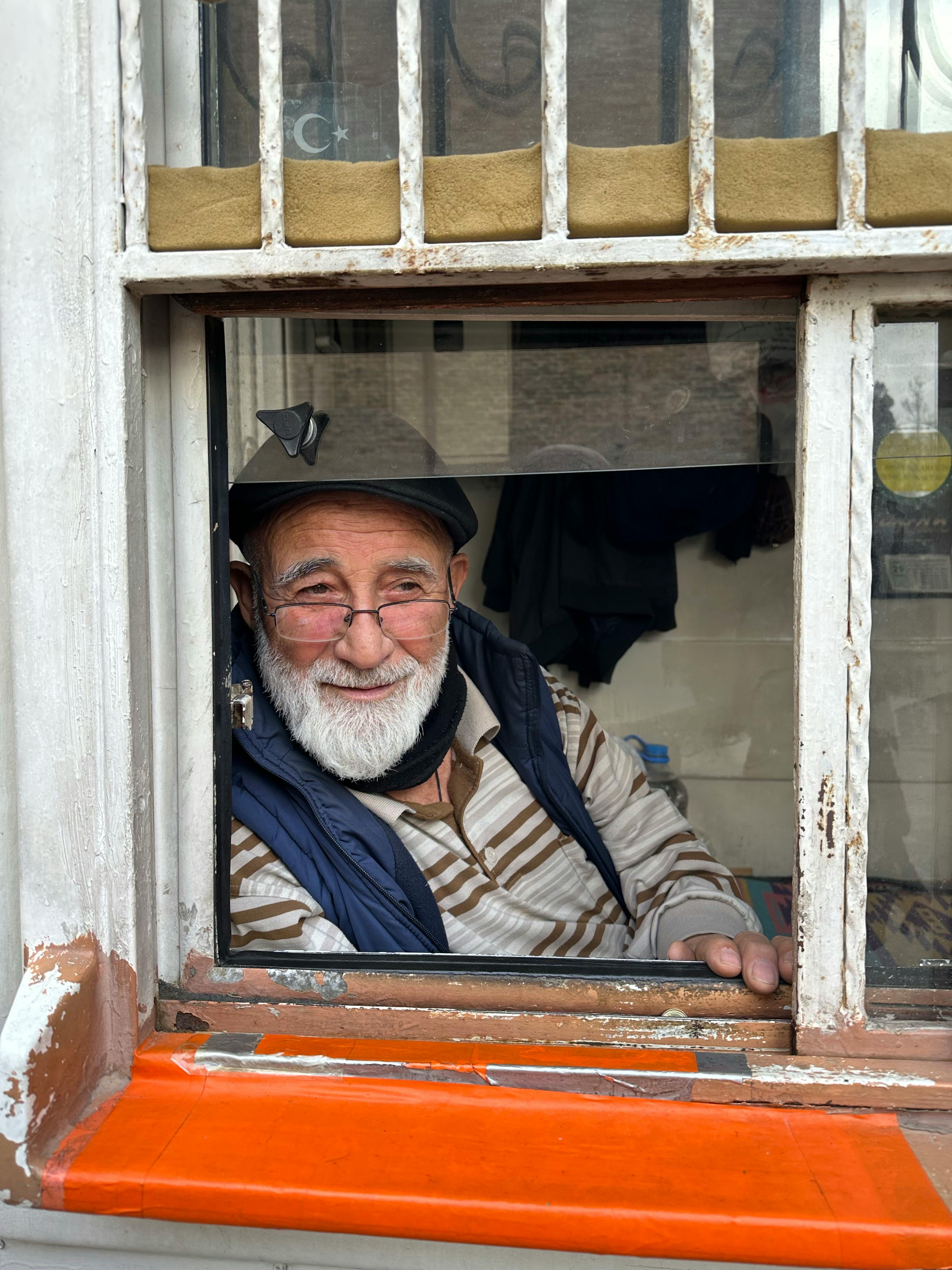 An Elderly Man Through the Window · Free Stock Photo