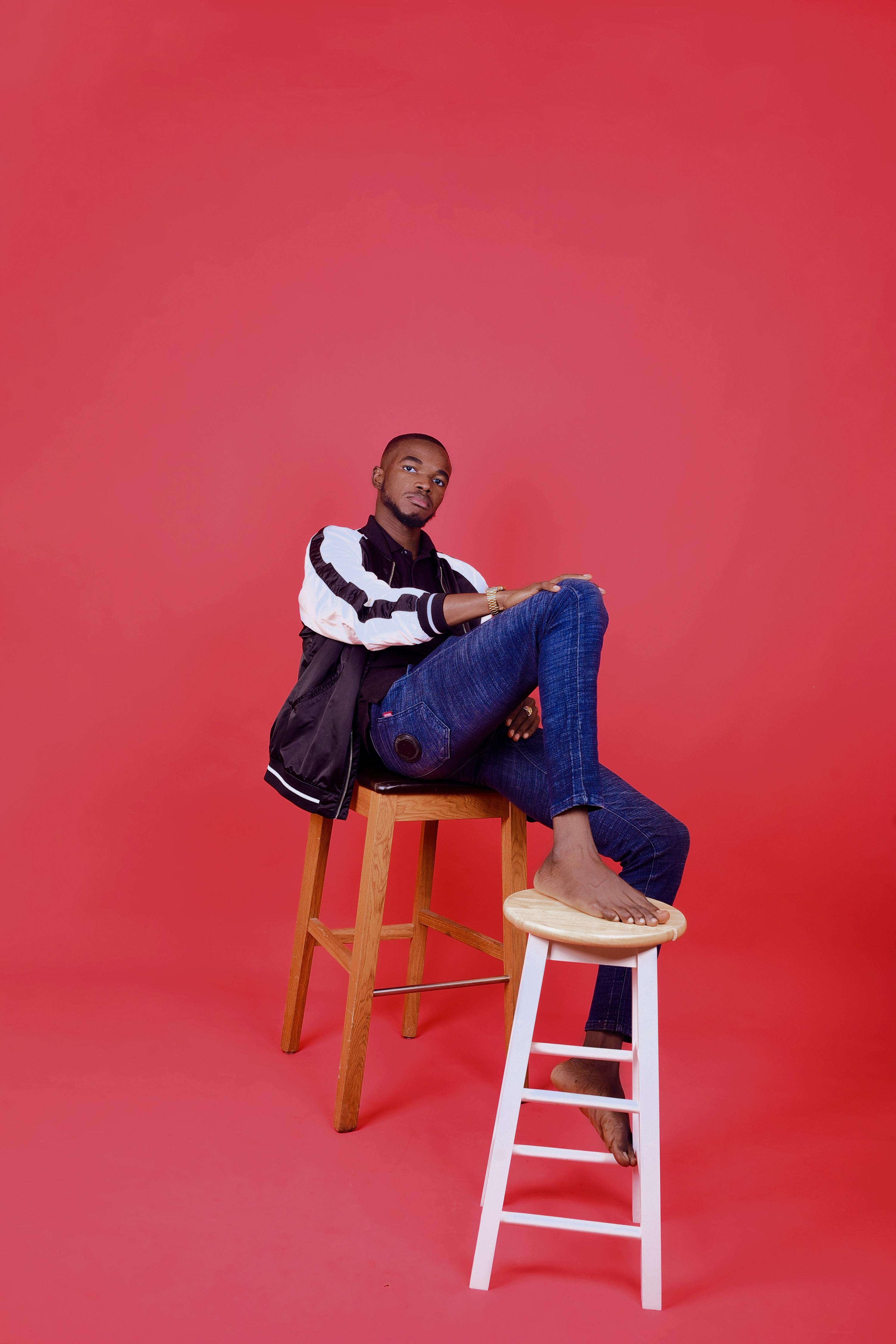 Man Standing on his Tip Toes in a Fashion Photoshoot · Free Stock Photo