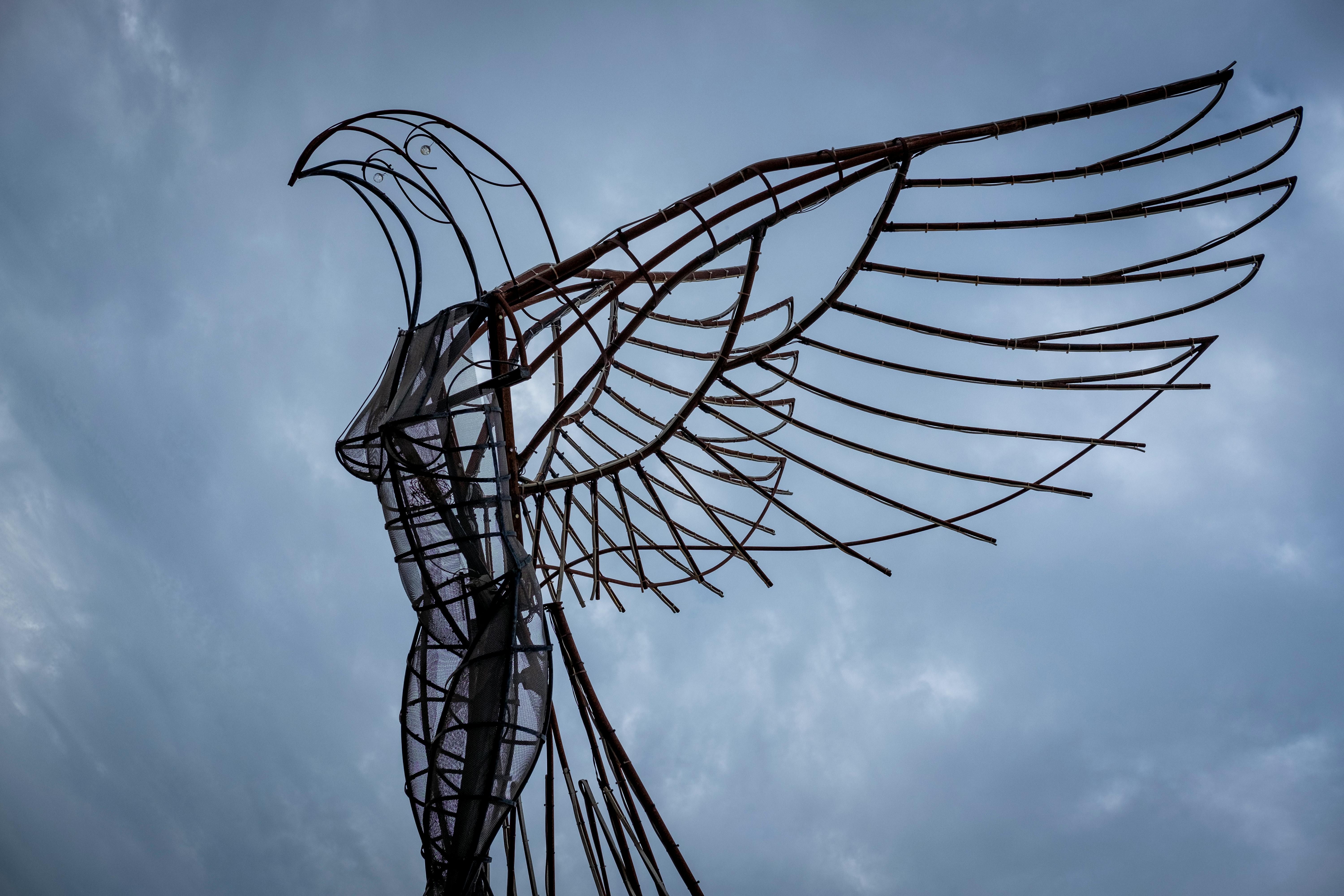 Metal Sculpture with Wings · Free Stock Photo