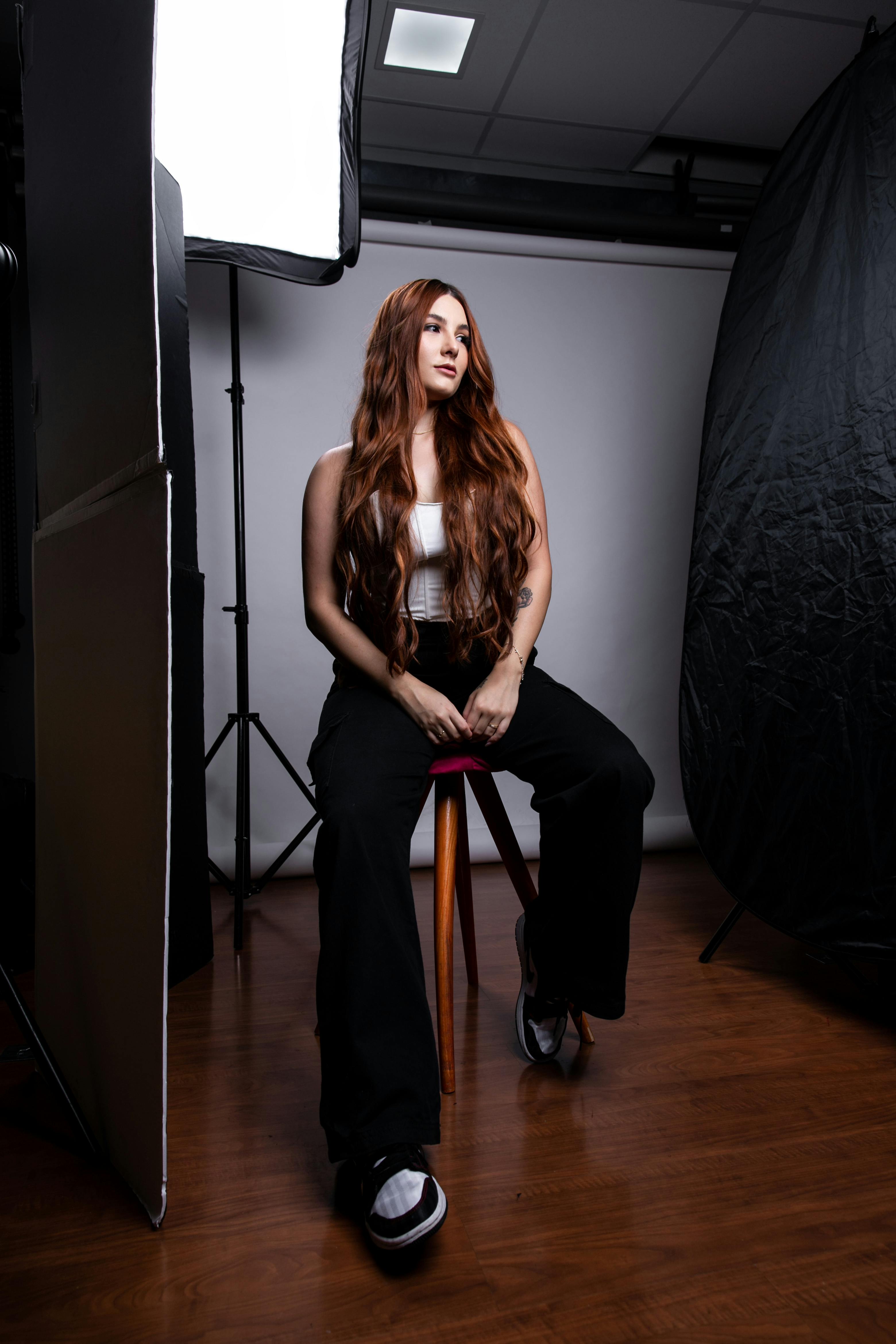 Model on Chair at Studio · Free Stock Photo