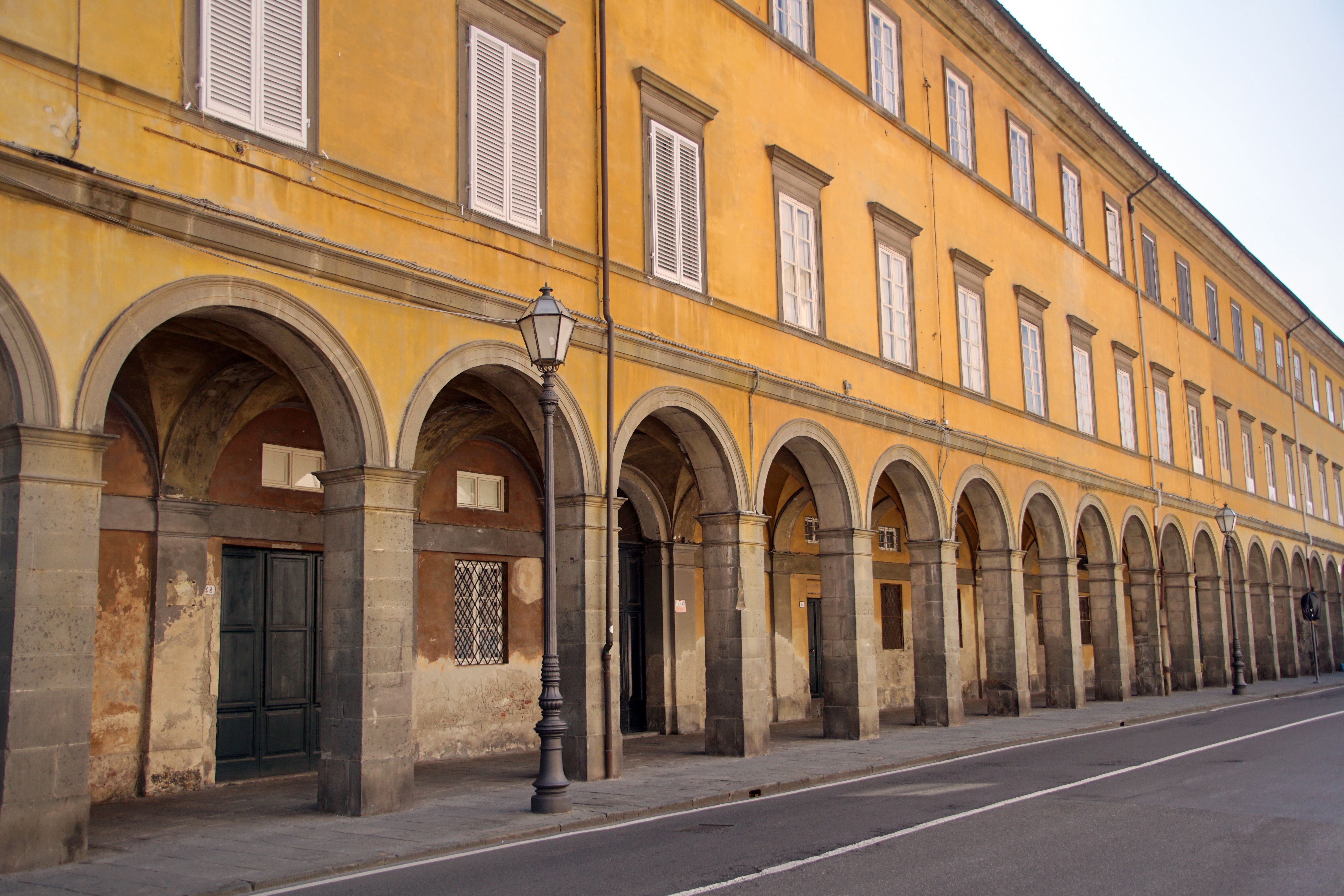 Yellow Building by Street in Town · Free Stock Photo