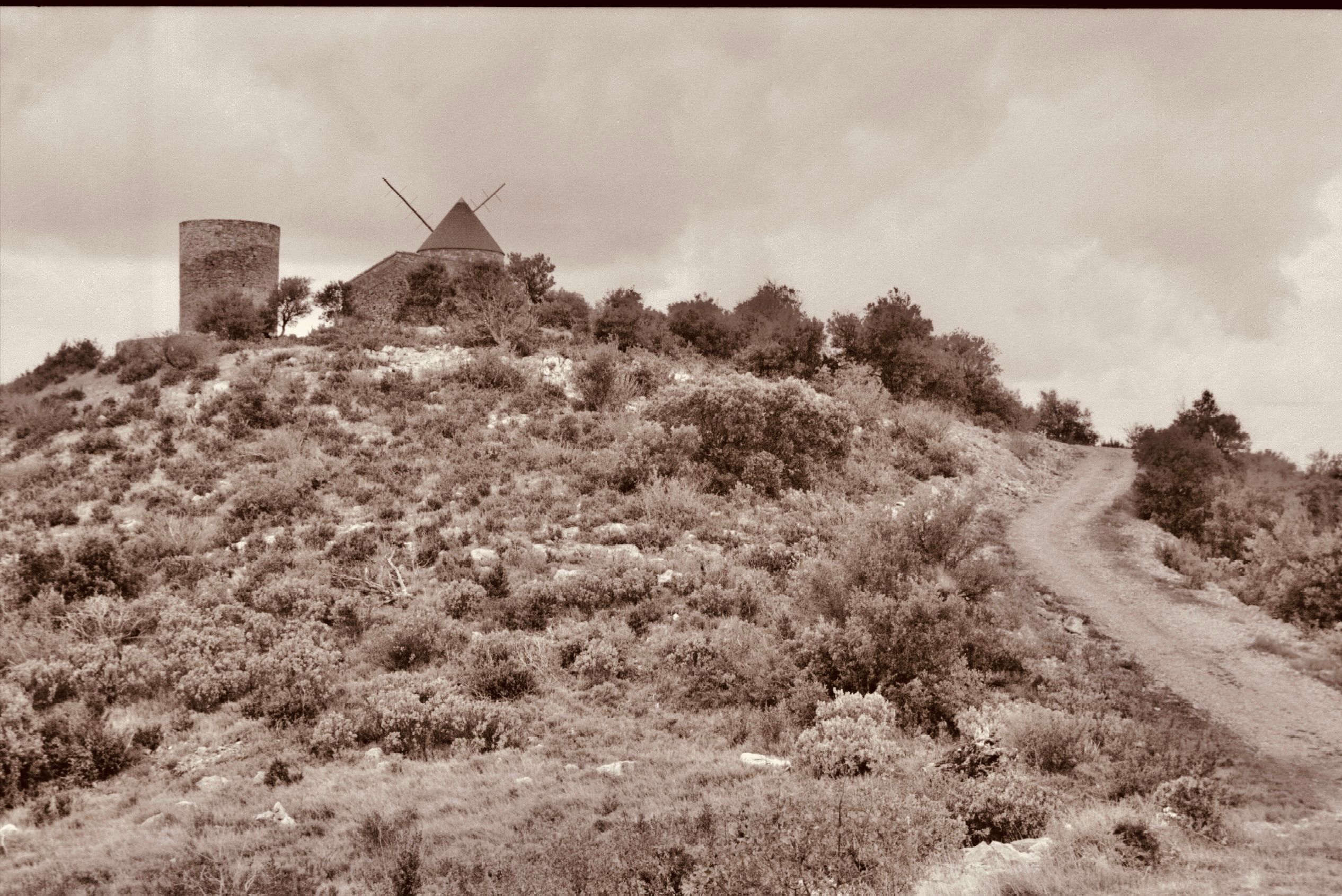 An Old Windmill on Top of a Hill · Free Stock Photo