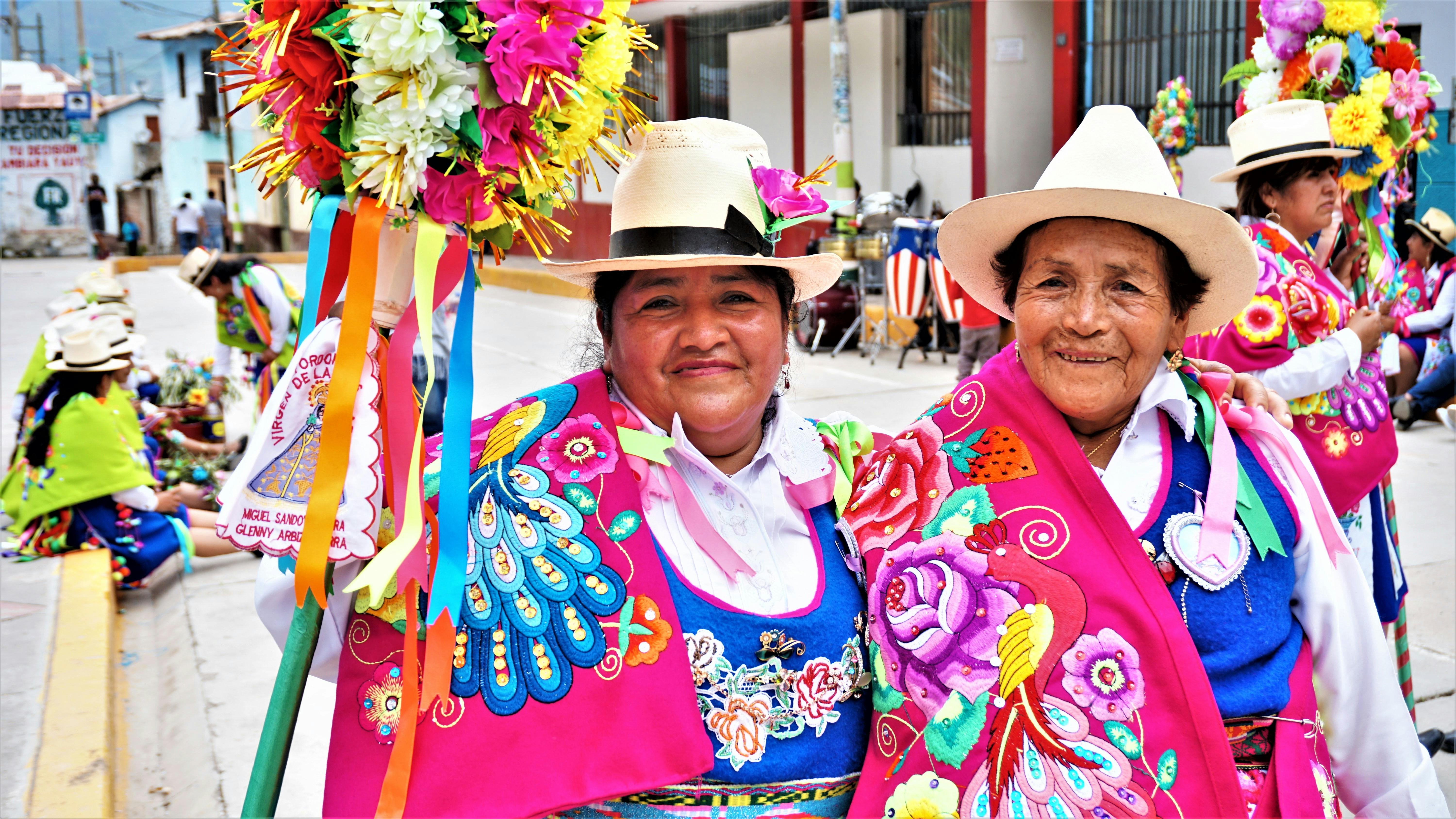 Women in Colorful Traditional Clothing on a Parade · Free Stock Photo