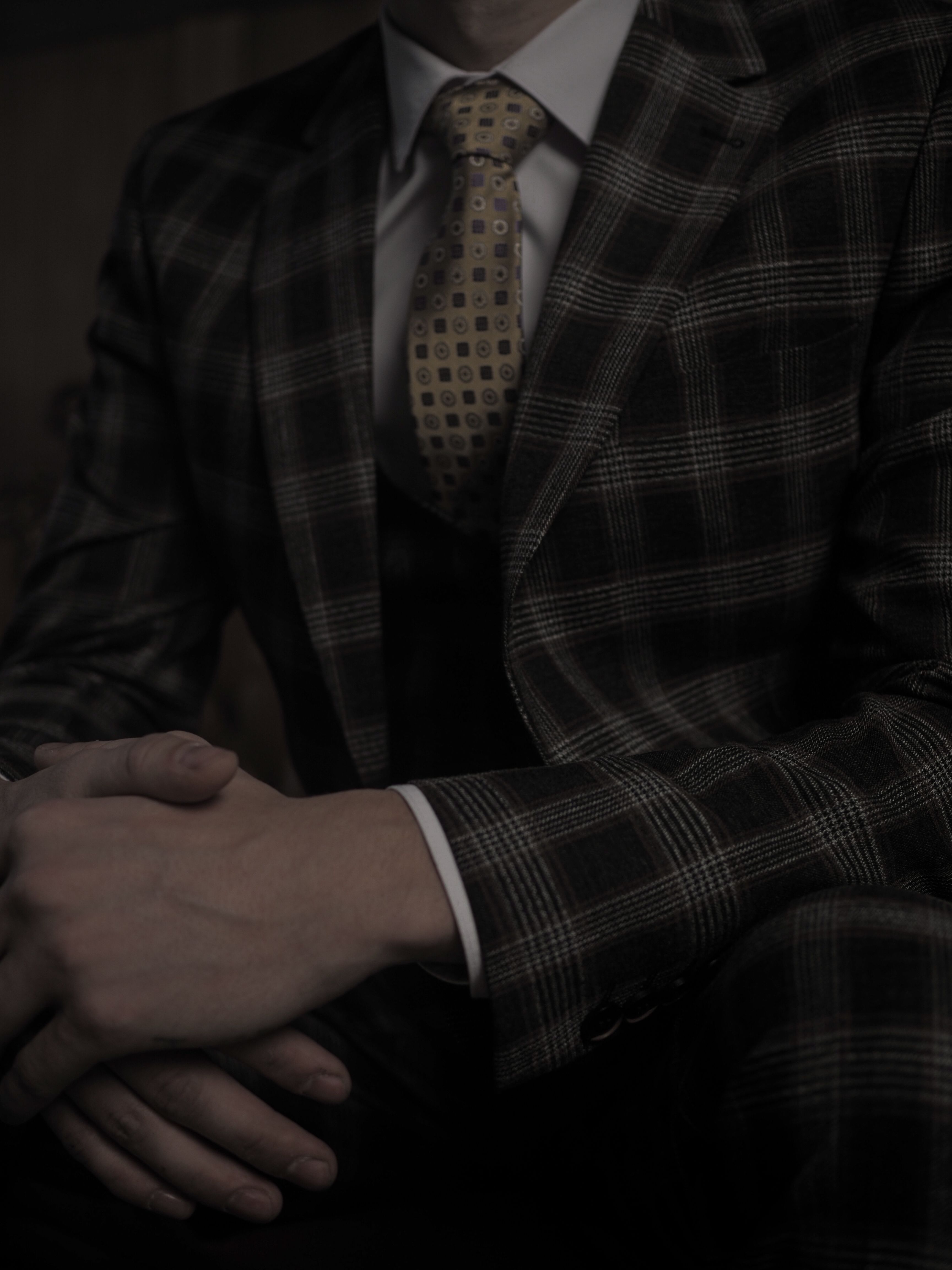 Close-up of a Man in a Checkered Suit · Free Stock Photo