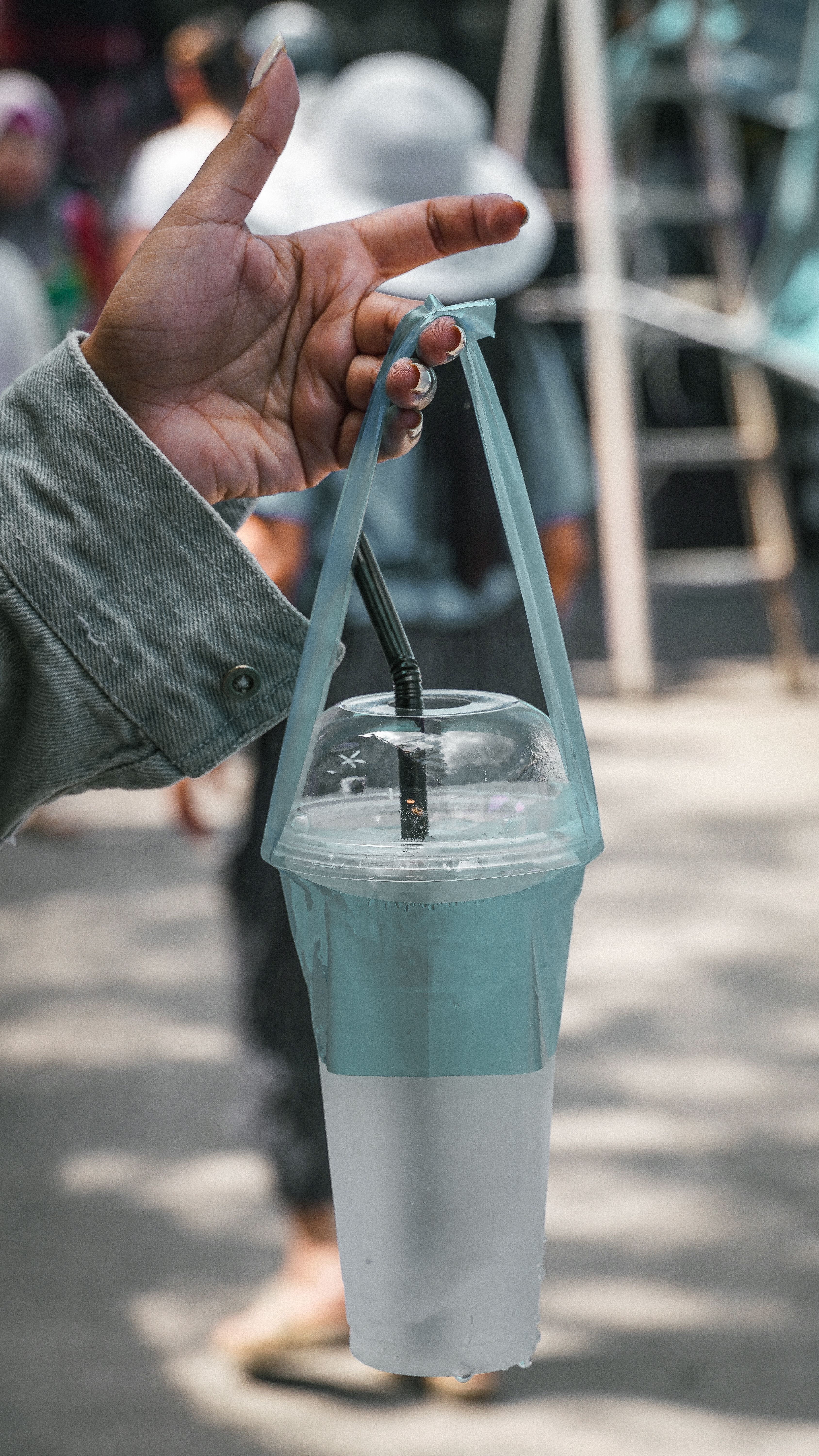 Photo of Person Holding Plastic Cup With Water · Free Stock Photo