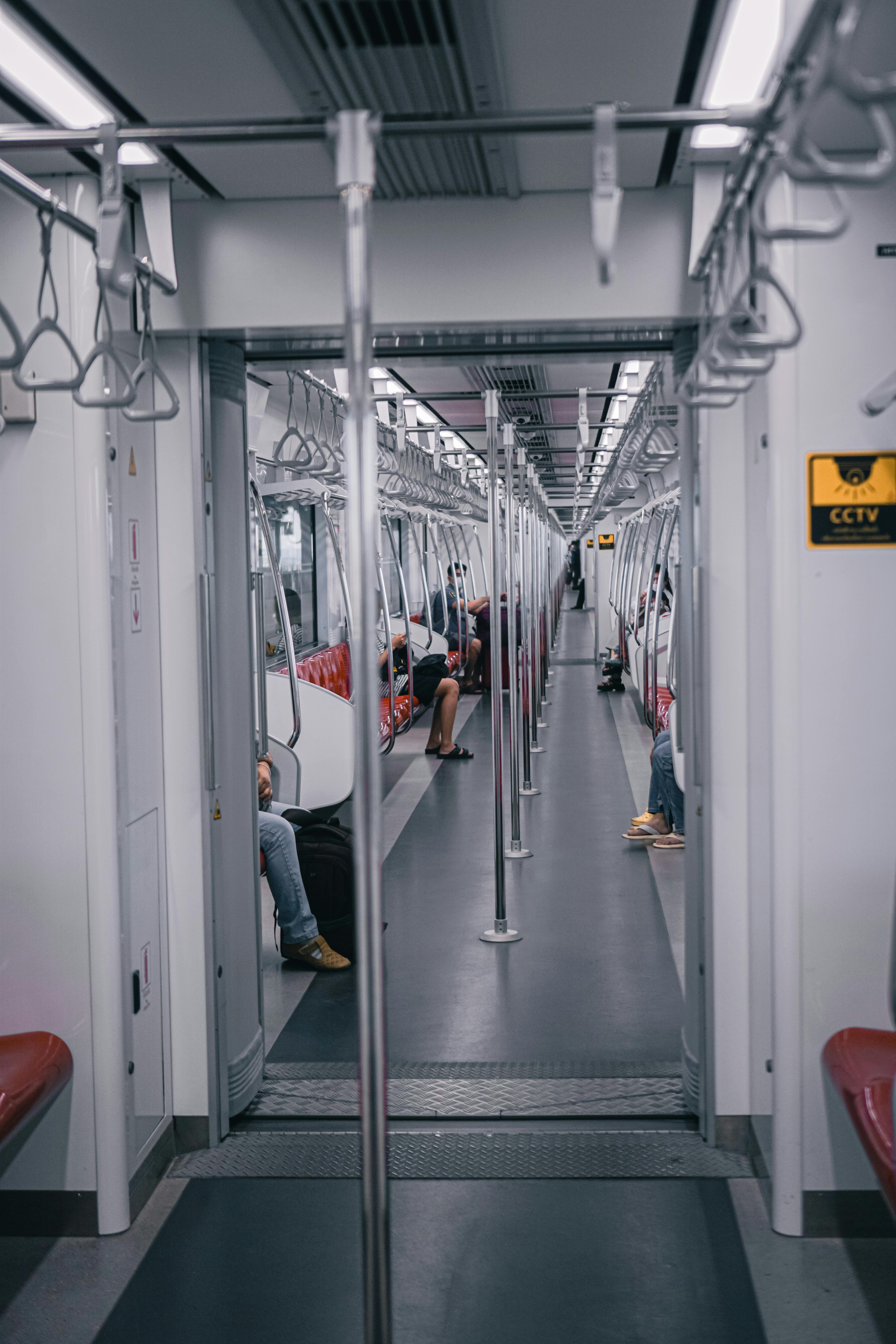 Photo of People Going In and Out of a Metro · Free Stock Photo