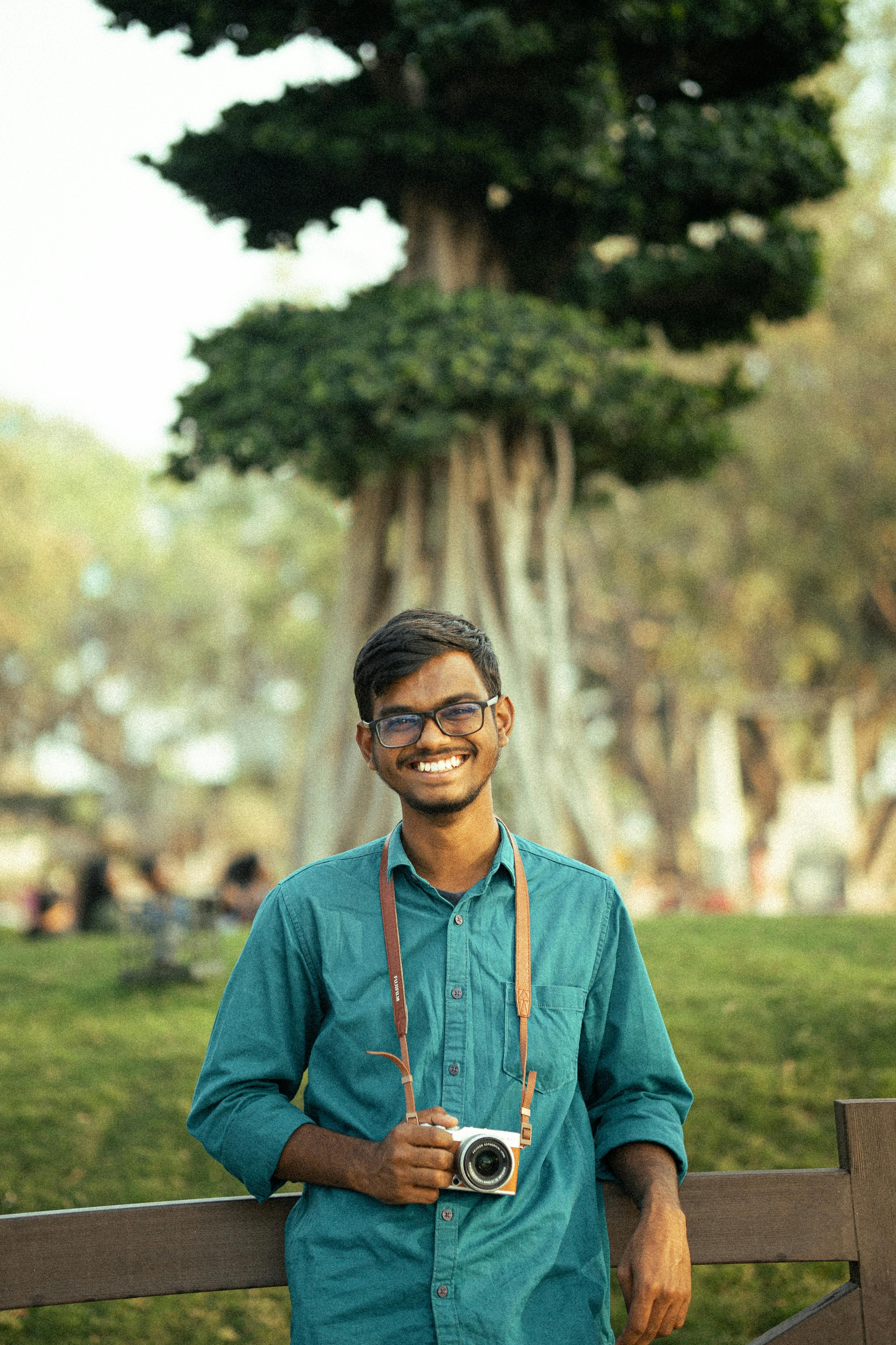 Three Men Holding up Cameras · Free Stock Photo