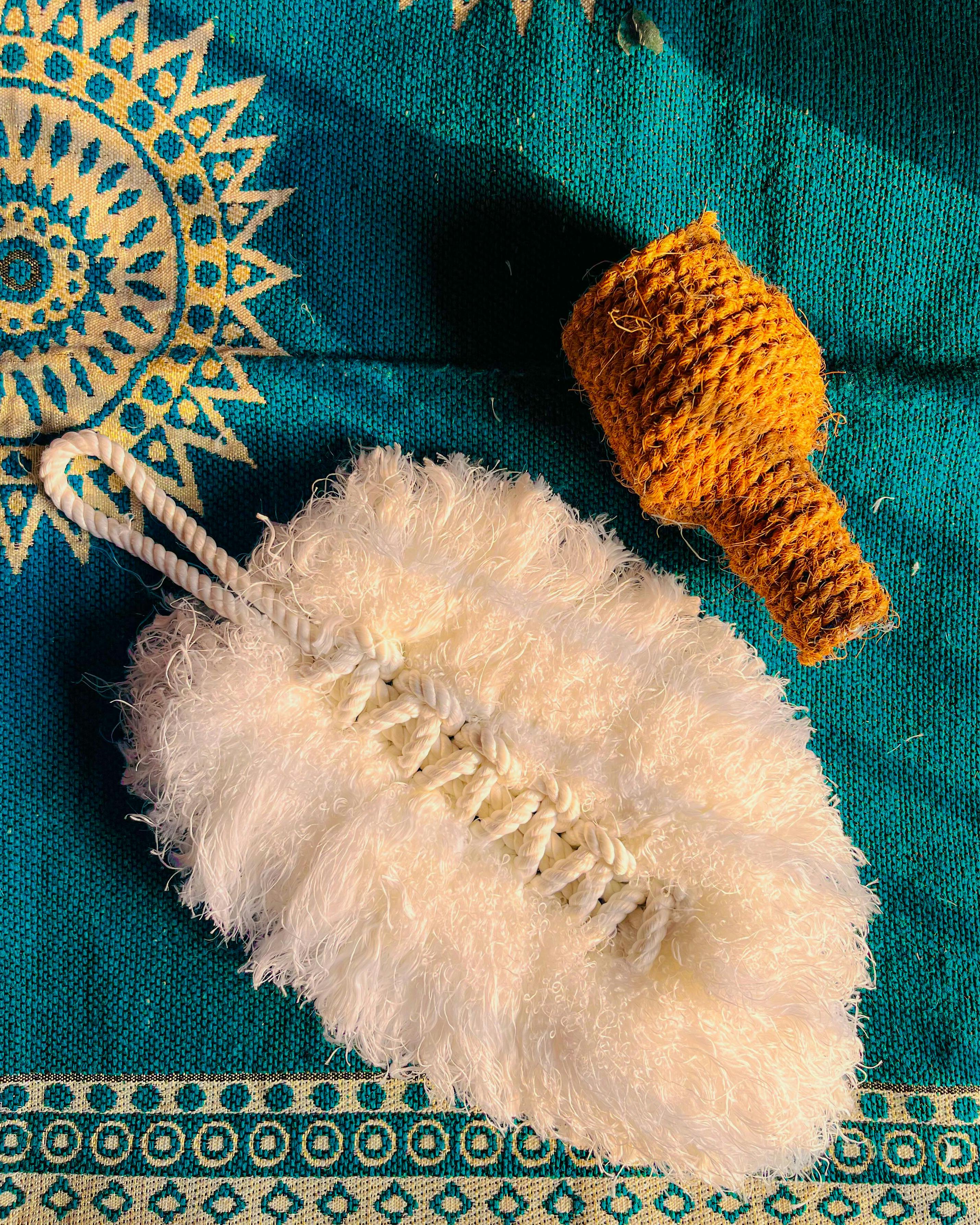 Orange String and a White Fluffy Material · Free Stock Photo