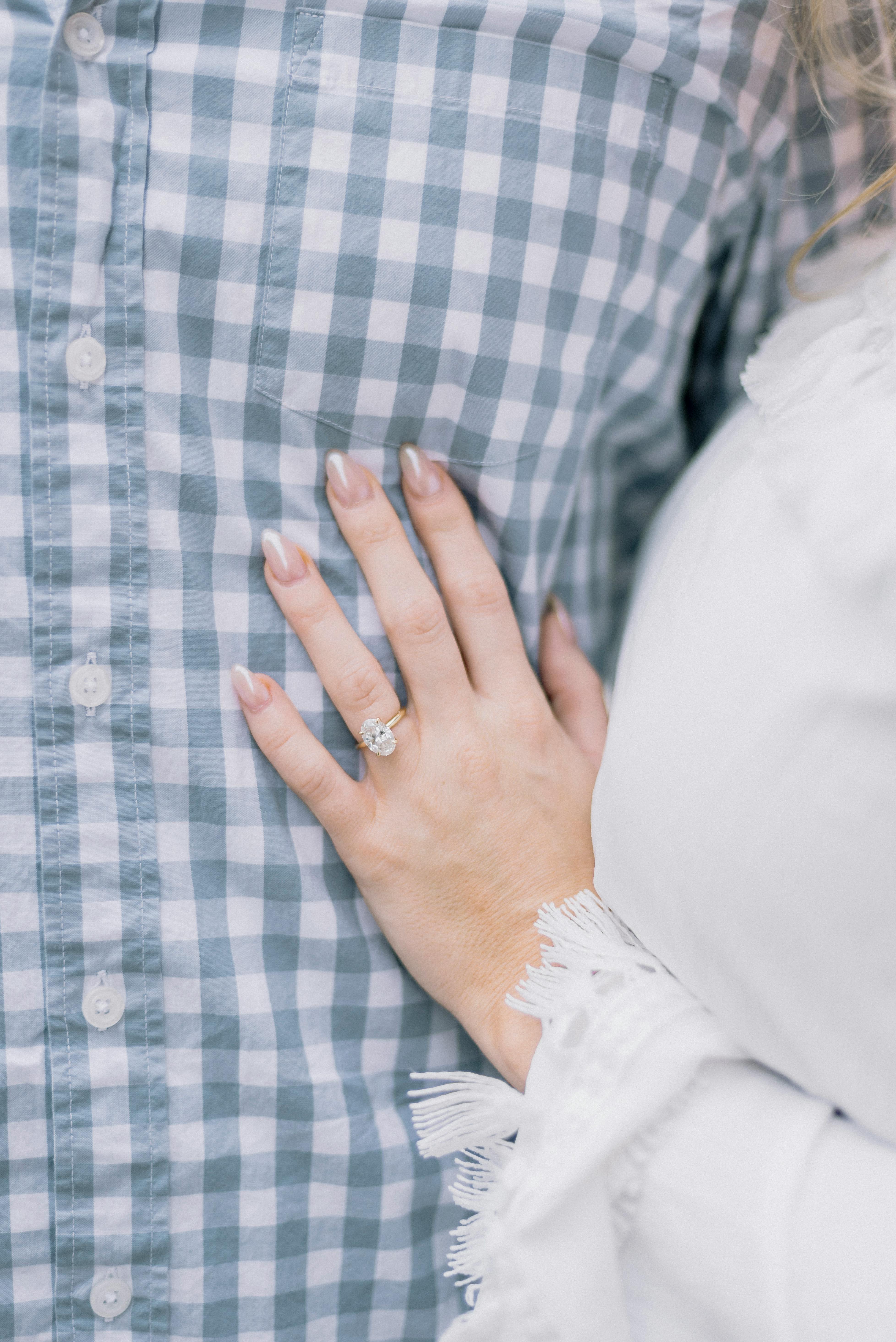 Woman Wearing Silver-colored Solitaire Ring Holding Person's Arm · Free ...