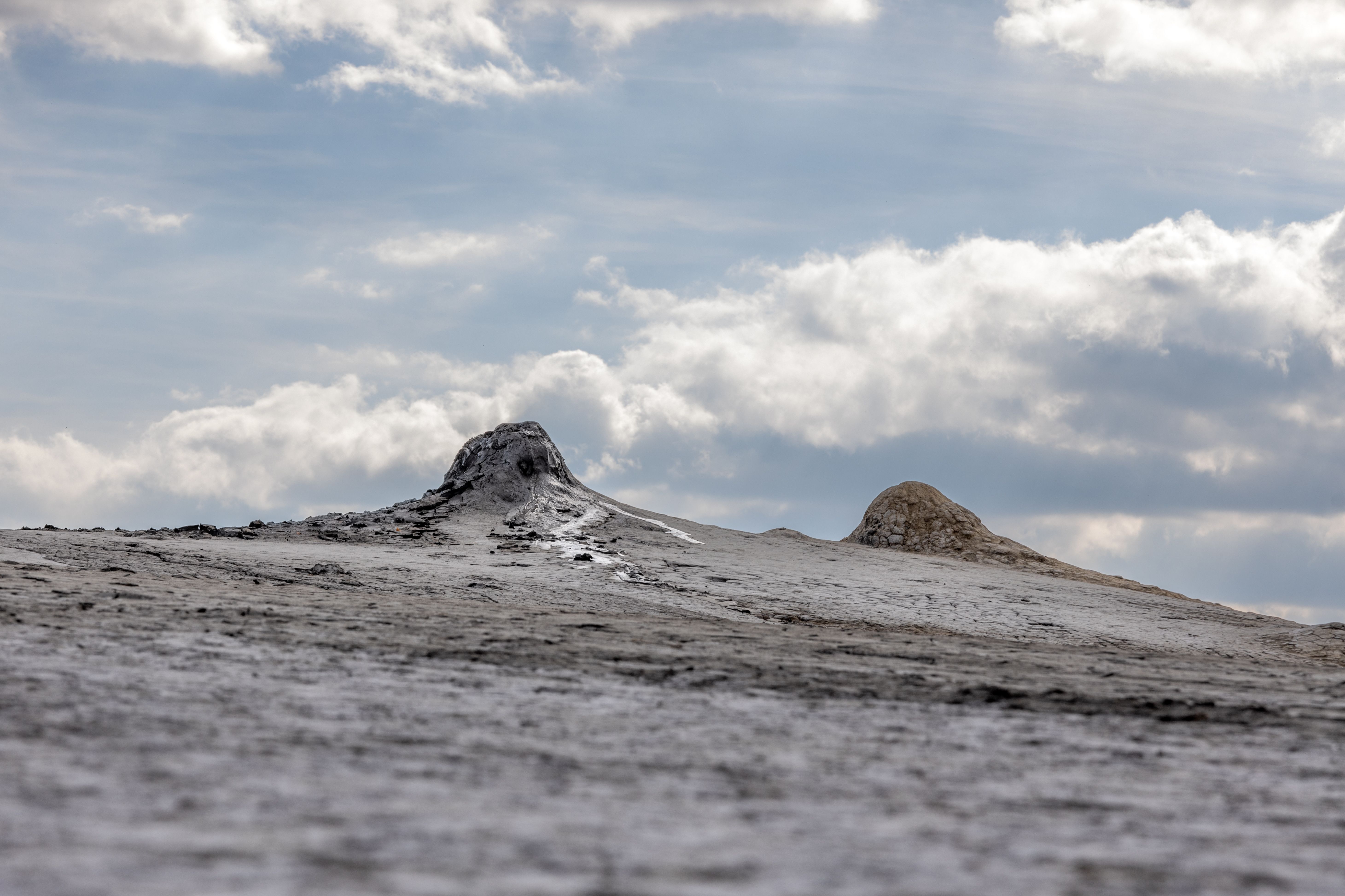 Rock Formations and Hill on Wasteland · Free Stock Photo