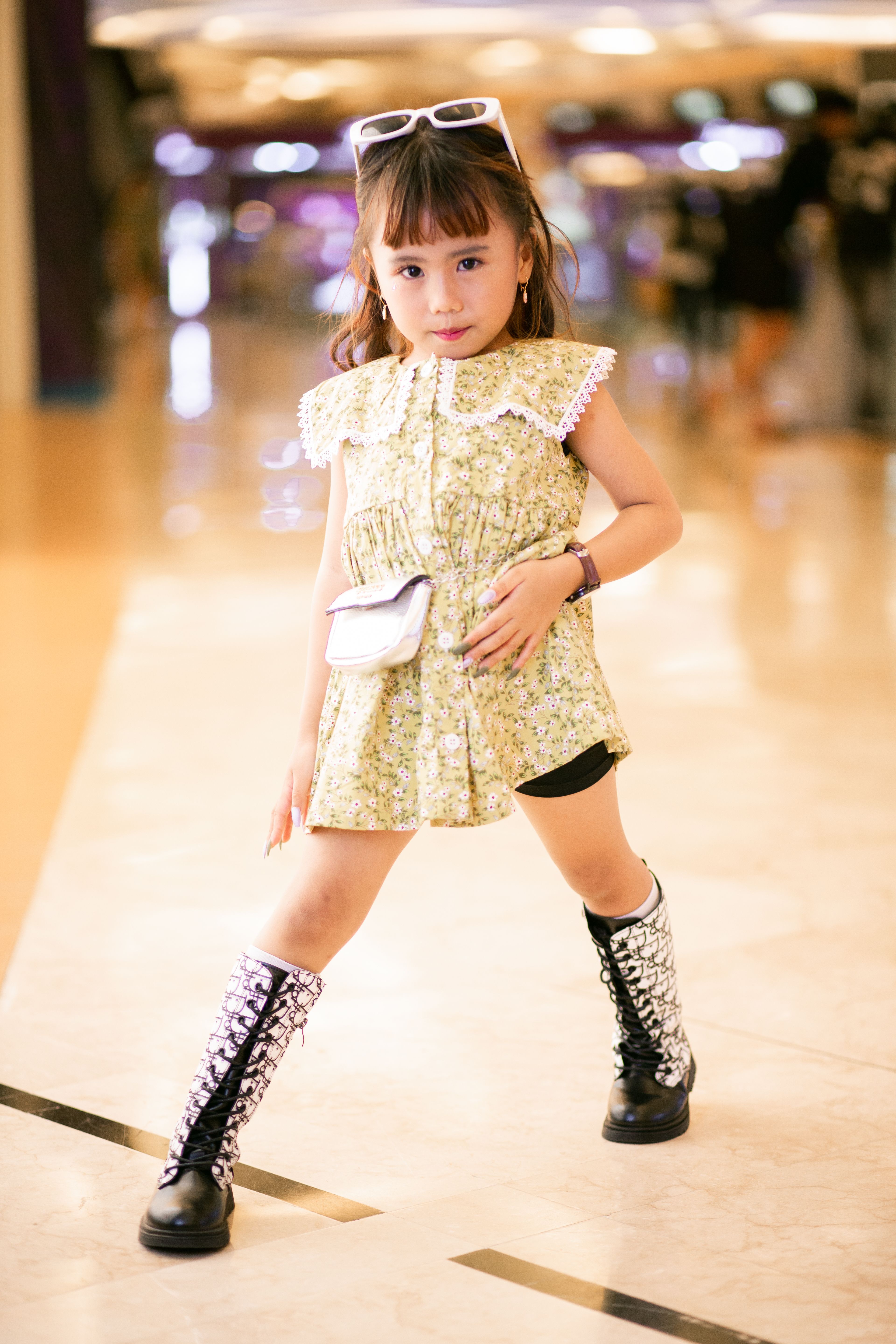 Photograph of a Kid with Boots Posing · Free Stock Photo