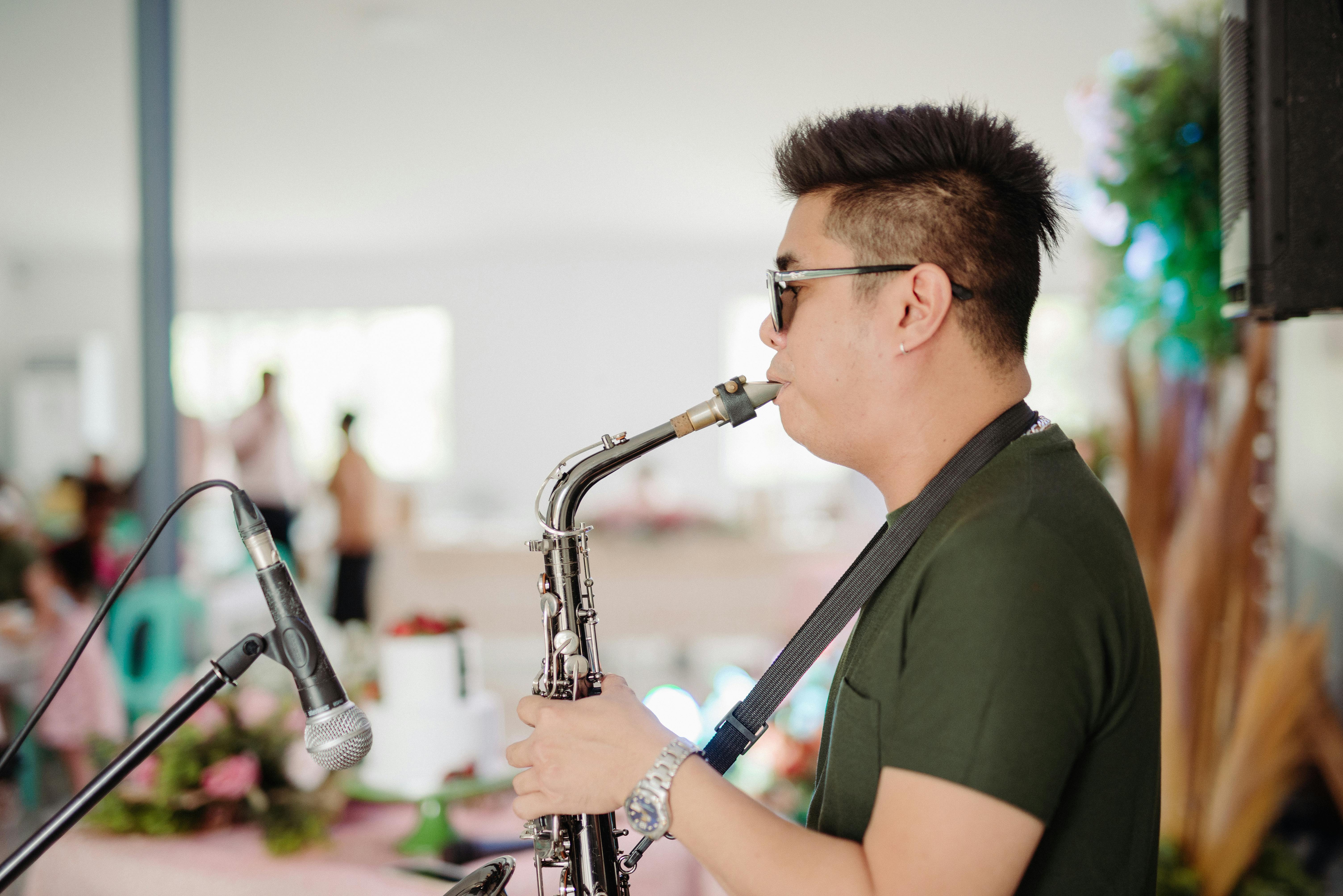 Musician Playing Saxophone · Free Stock Photo