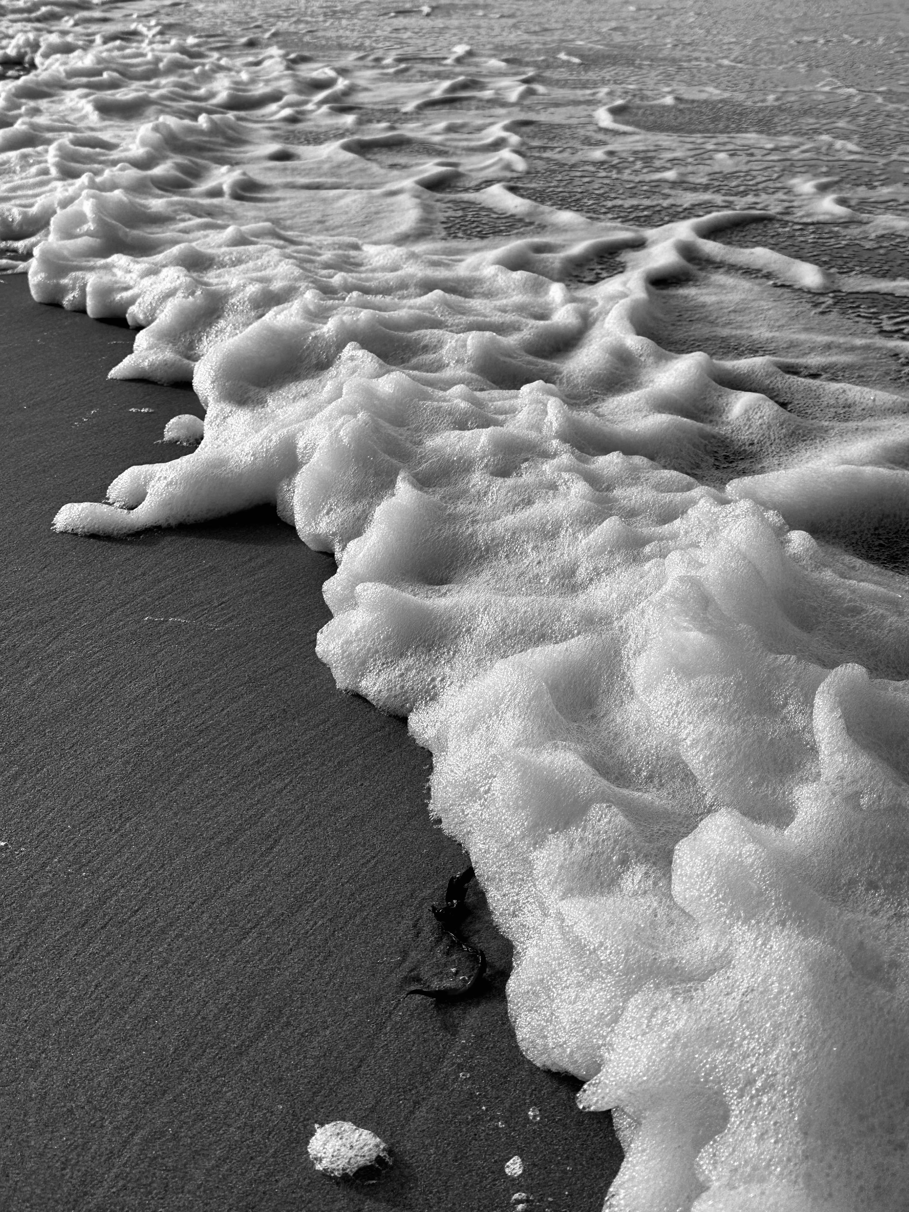 Sea Water Forming Seafoams · Free Stock Photo