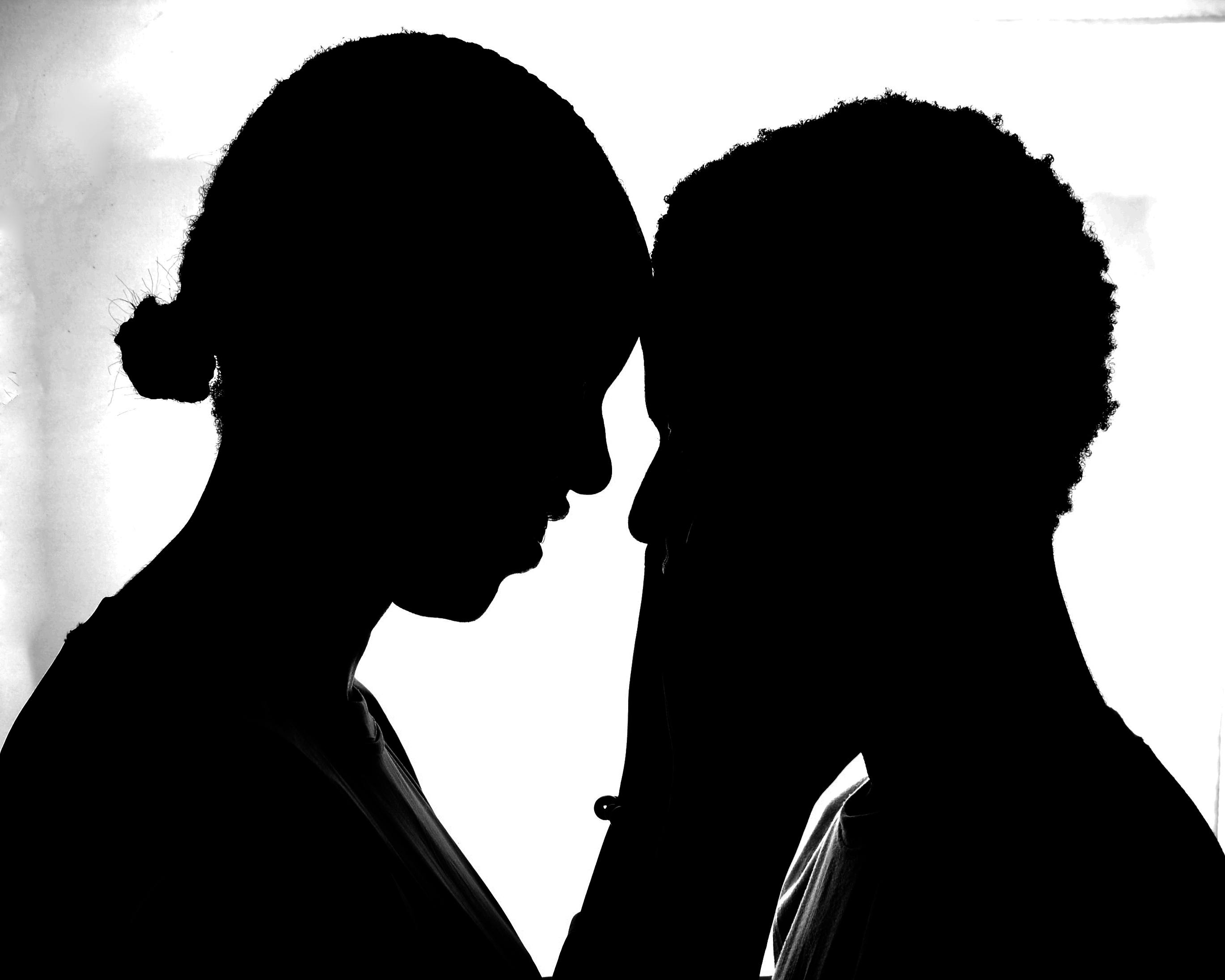 Outline of a Female Head Leaning on a Male Torso · Free Stock Photo