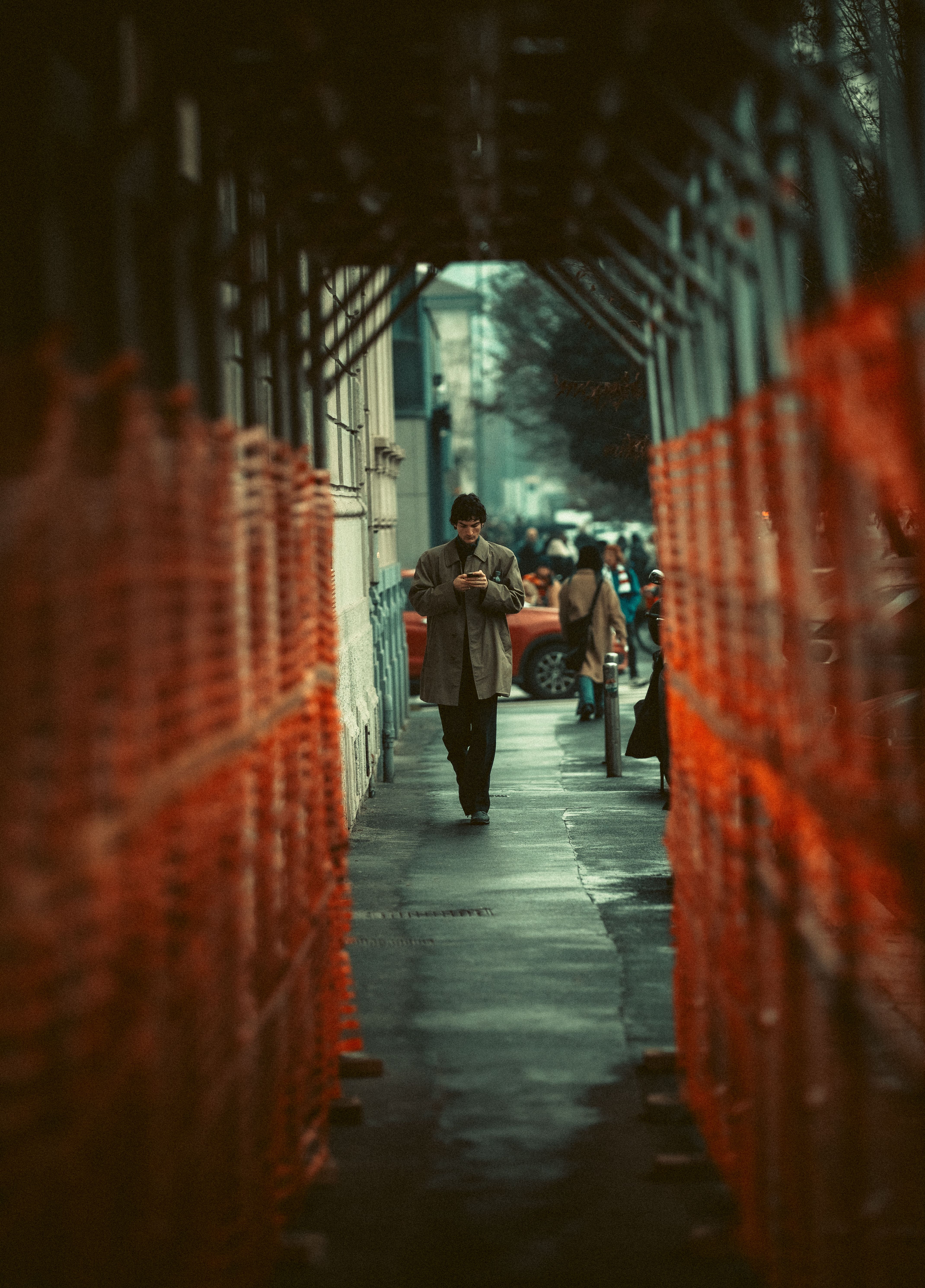 Scaffolding on Sidewalk and Man Walking behind · Free Stock Photo