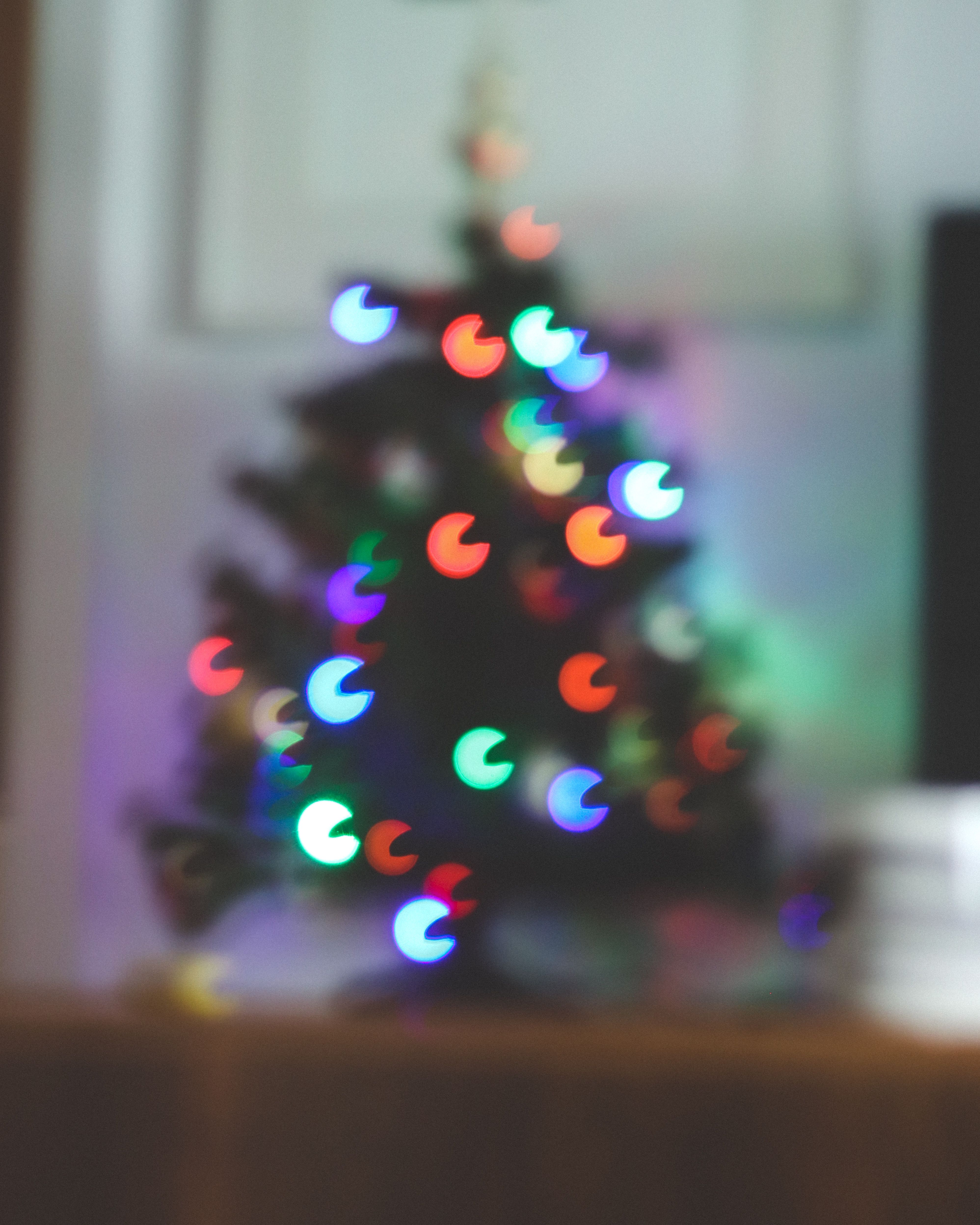 Illuminated Christmas Tree in Blur · Free Stock Photo