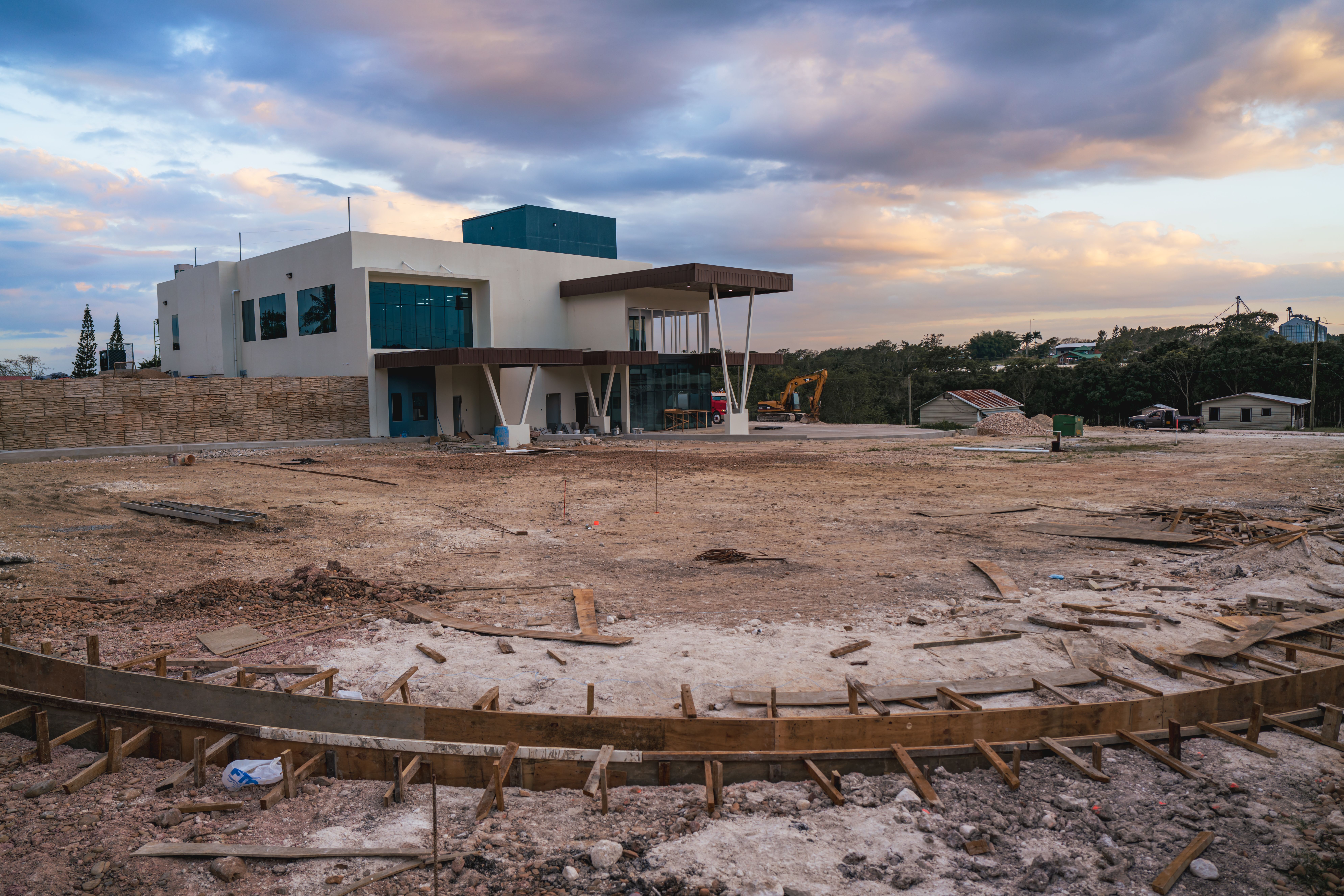 Construction Site Under Cloudy Sky · Free Stock Photo