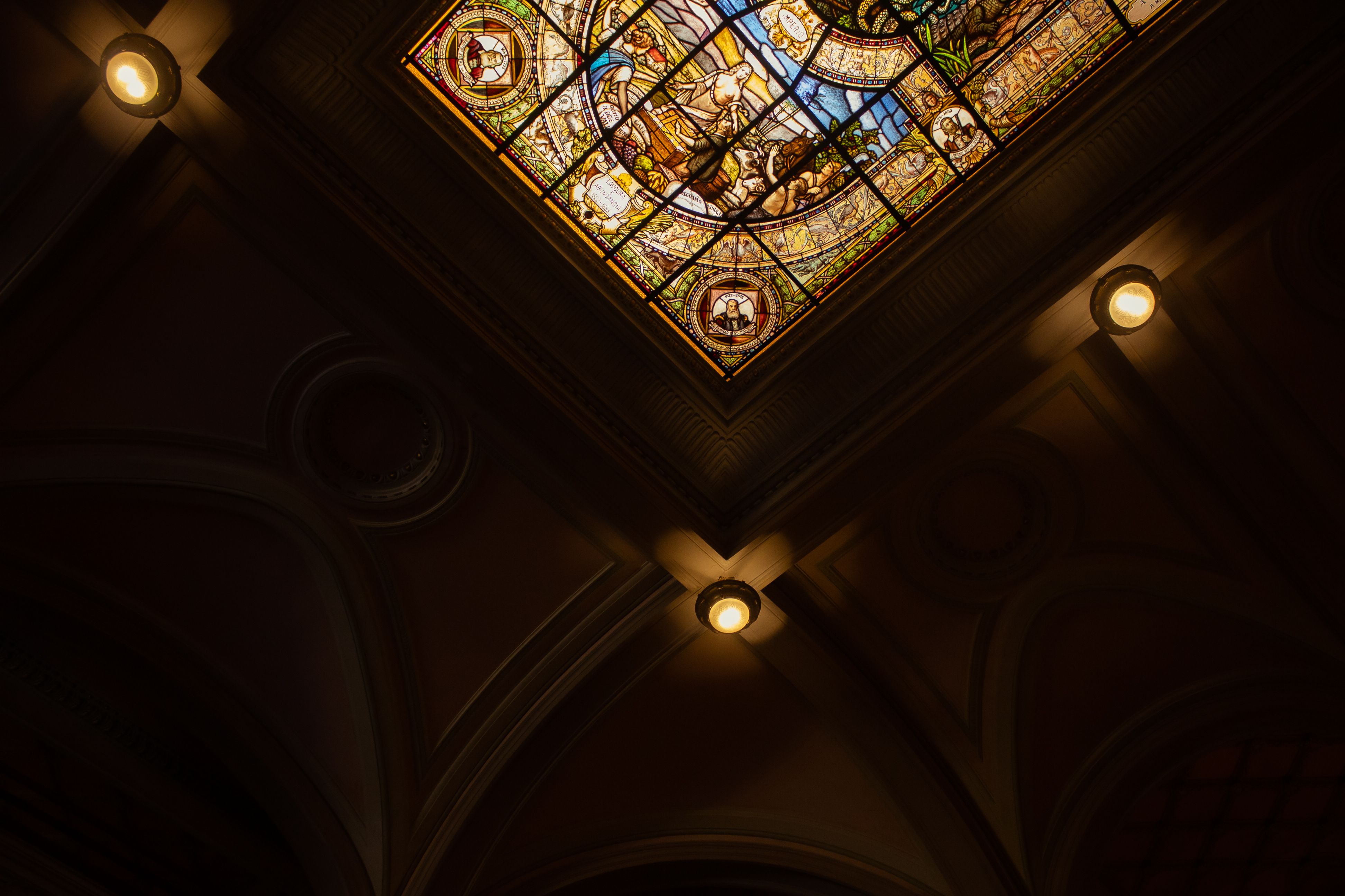 A stained glass window in a building · Free Stock Photo
