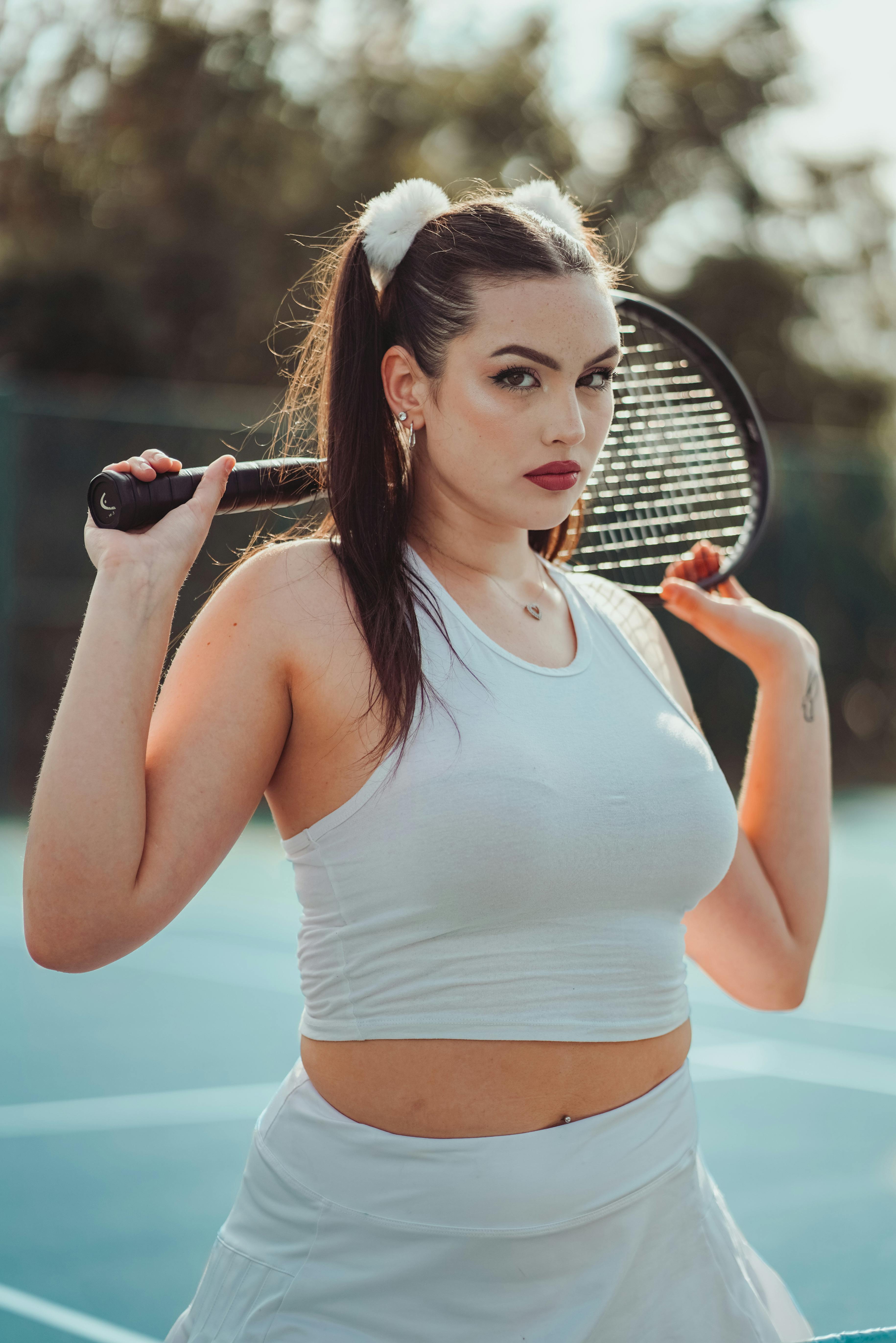 Woman With Tennis Racket · Free Stock Photo
