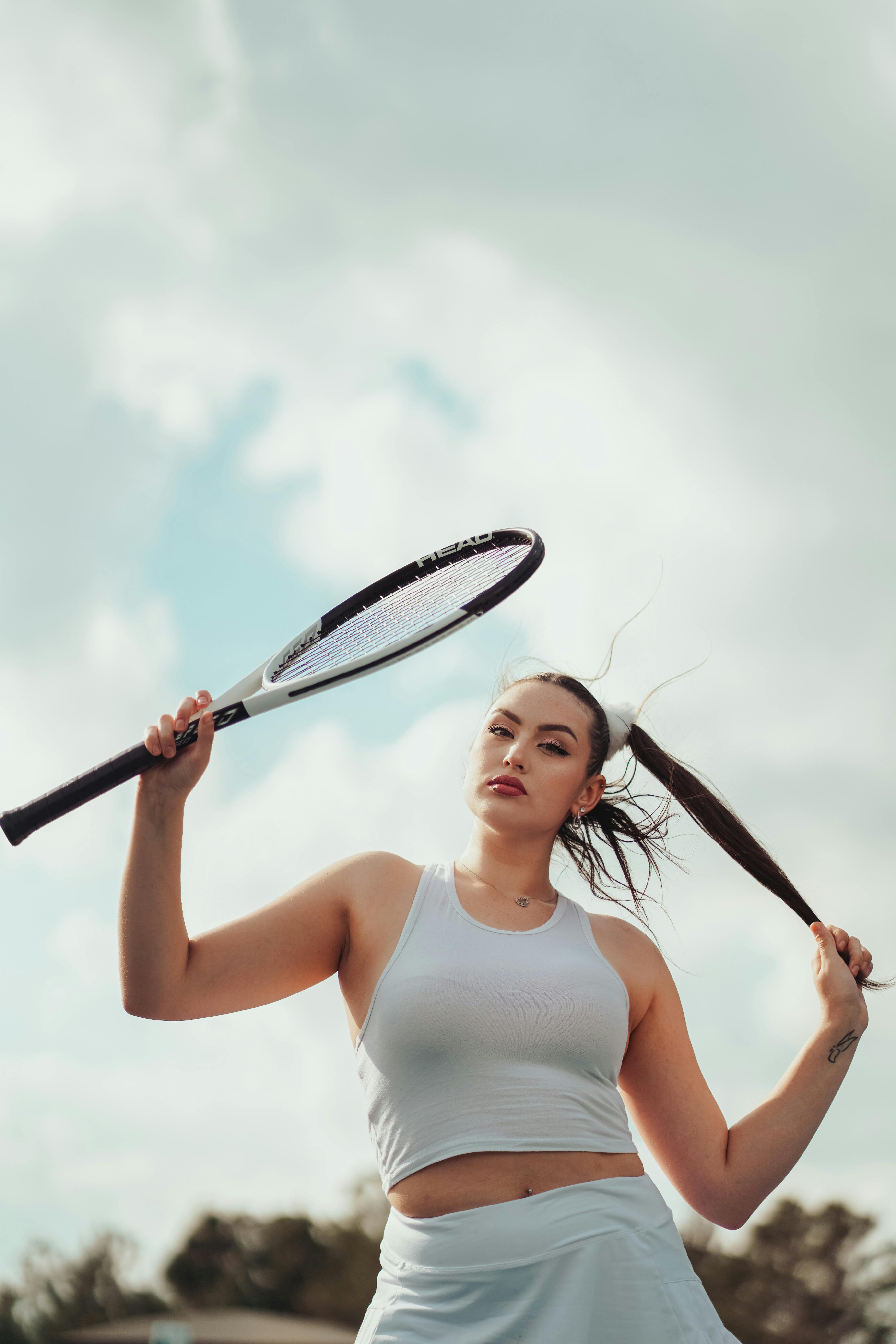 Woman With Tennis Racket · Free Stock Photo