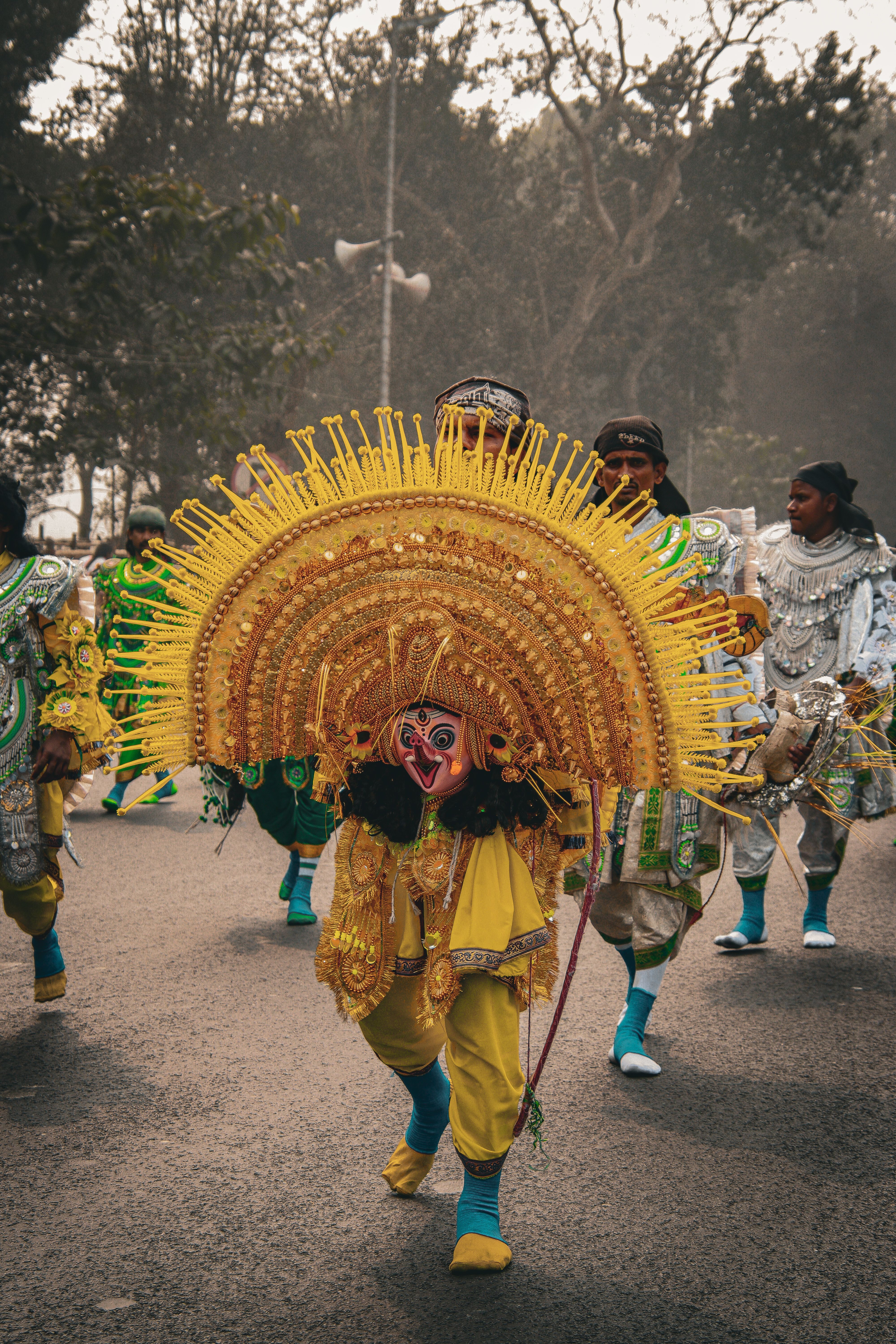 Dancer with Yellow Decoration at Parade on Street · Free Stock Photo