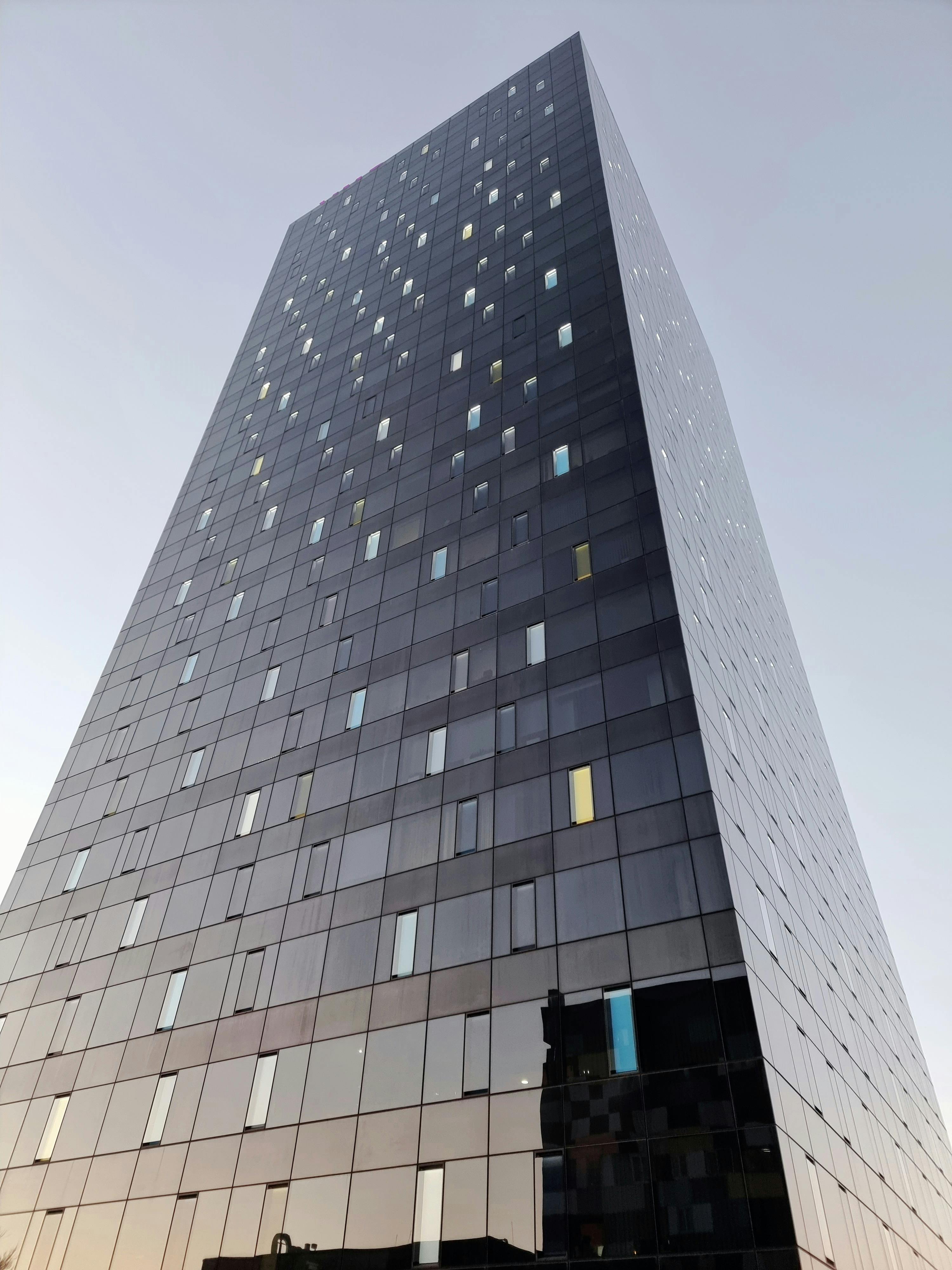 Blue Concrete Building Under Blue Sky · Free Stock Photo