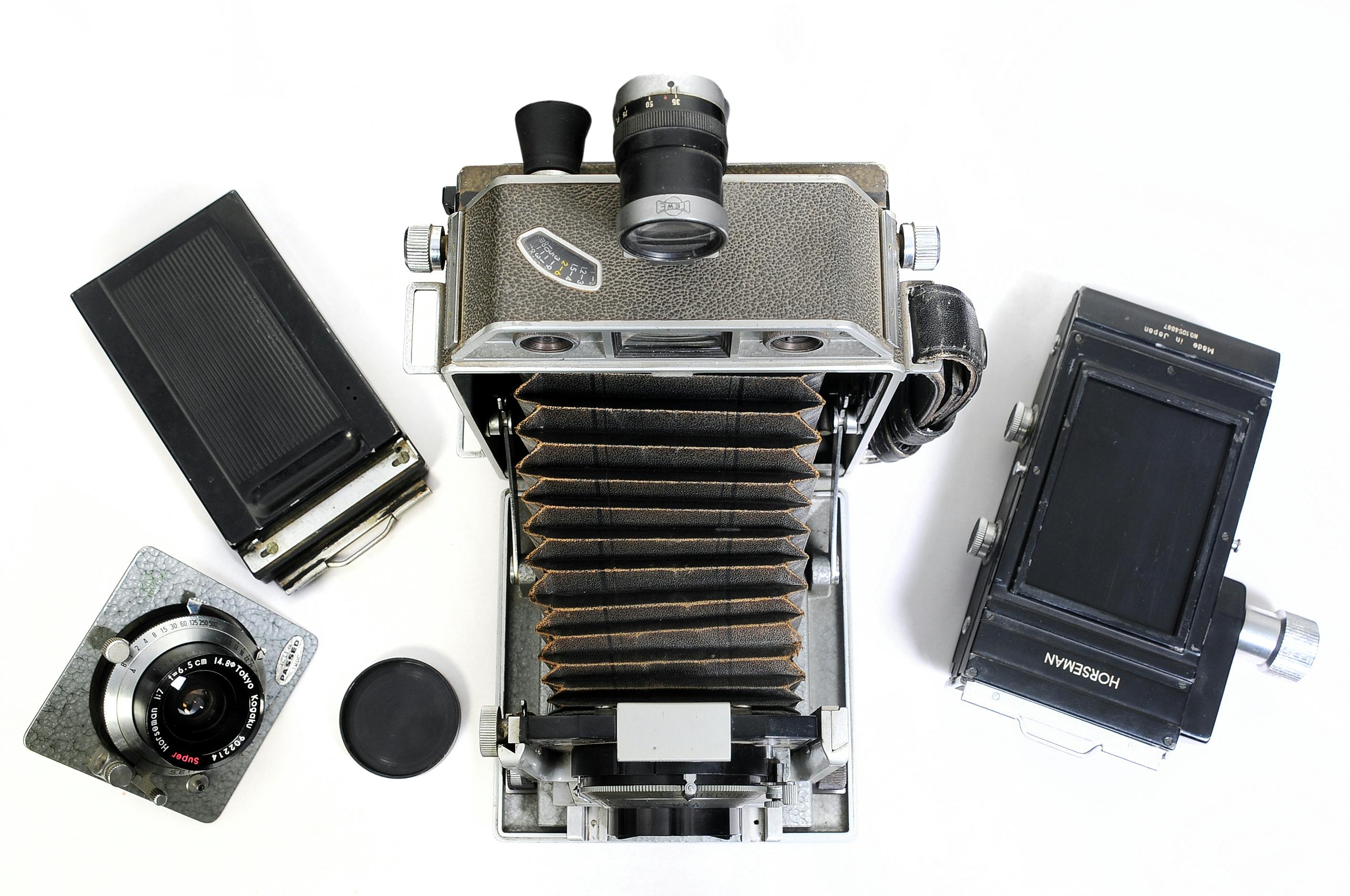 Assorted Black and Gray Cameras · Free Stock Photo