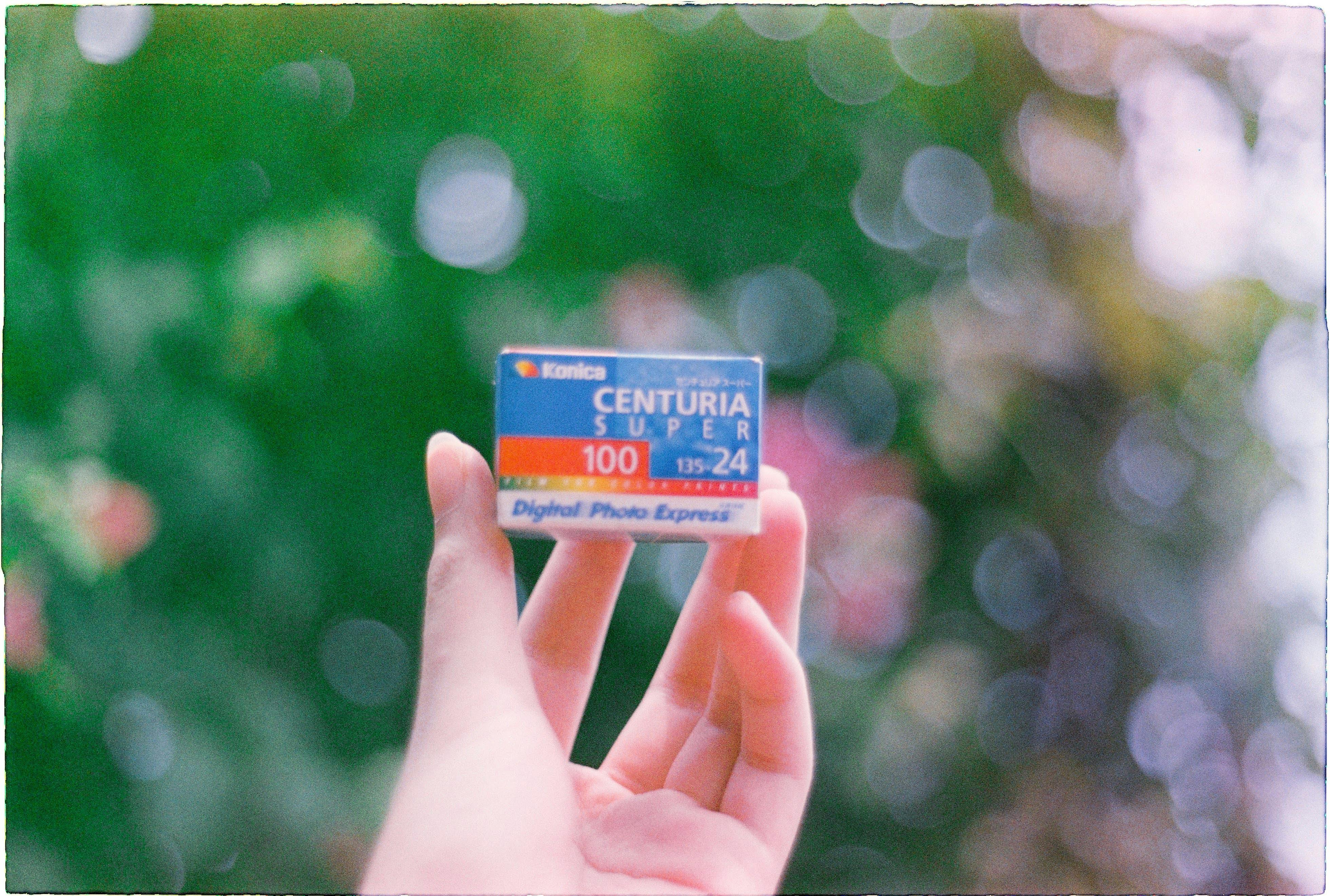 Woman Hand Holding Photographic Film Box · Free Stock Photo