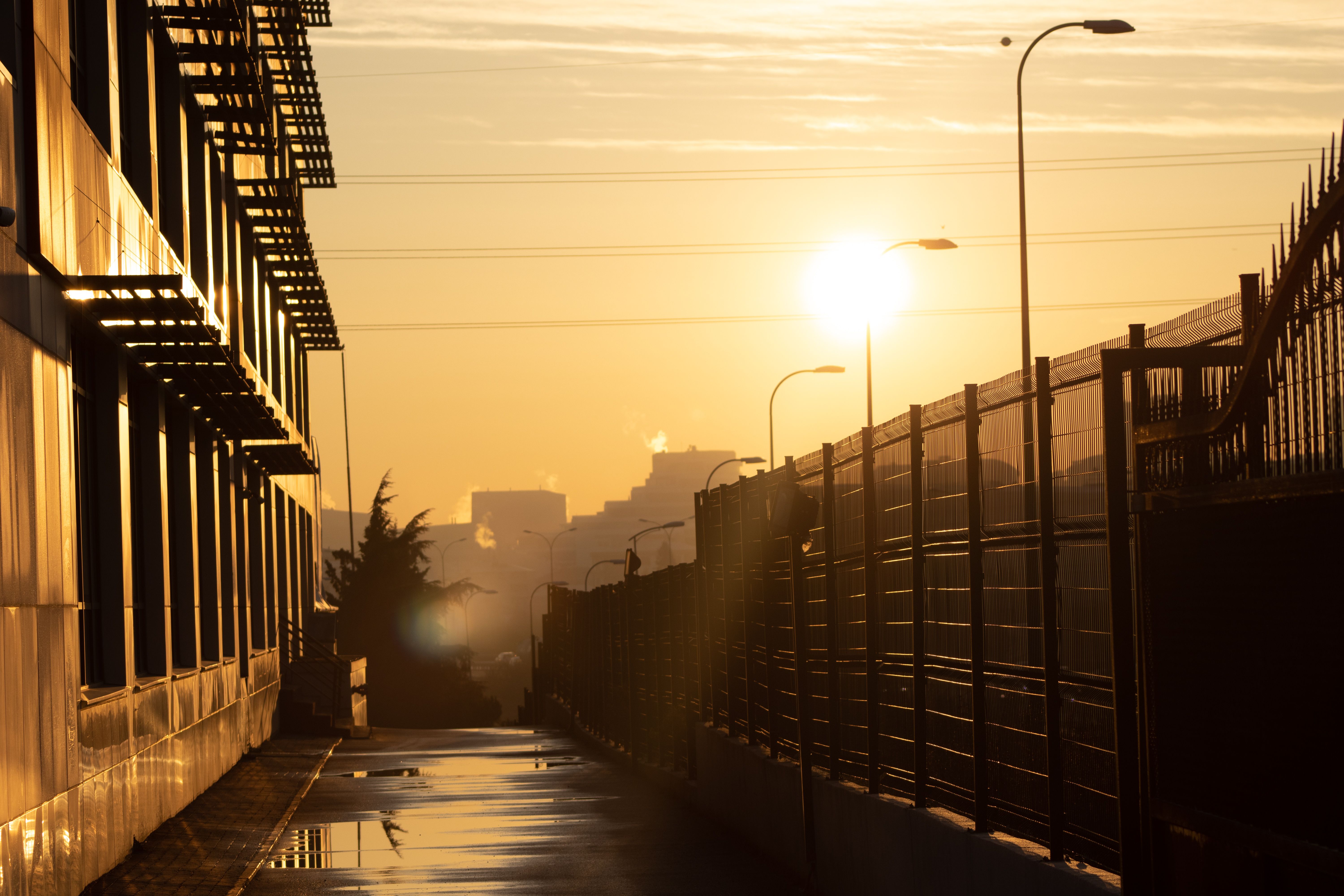 Sun over Wet Pavement after Rain · Free Stock Photo