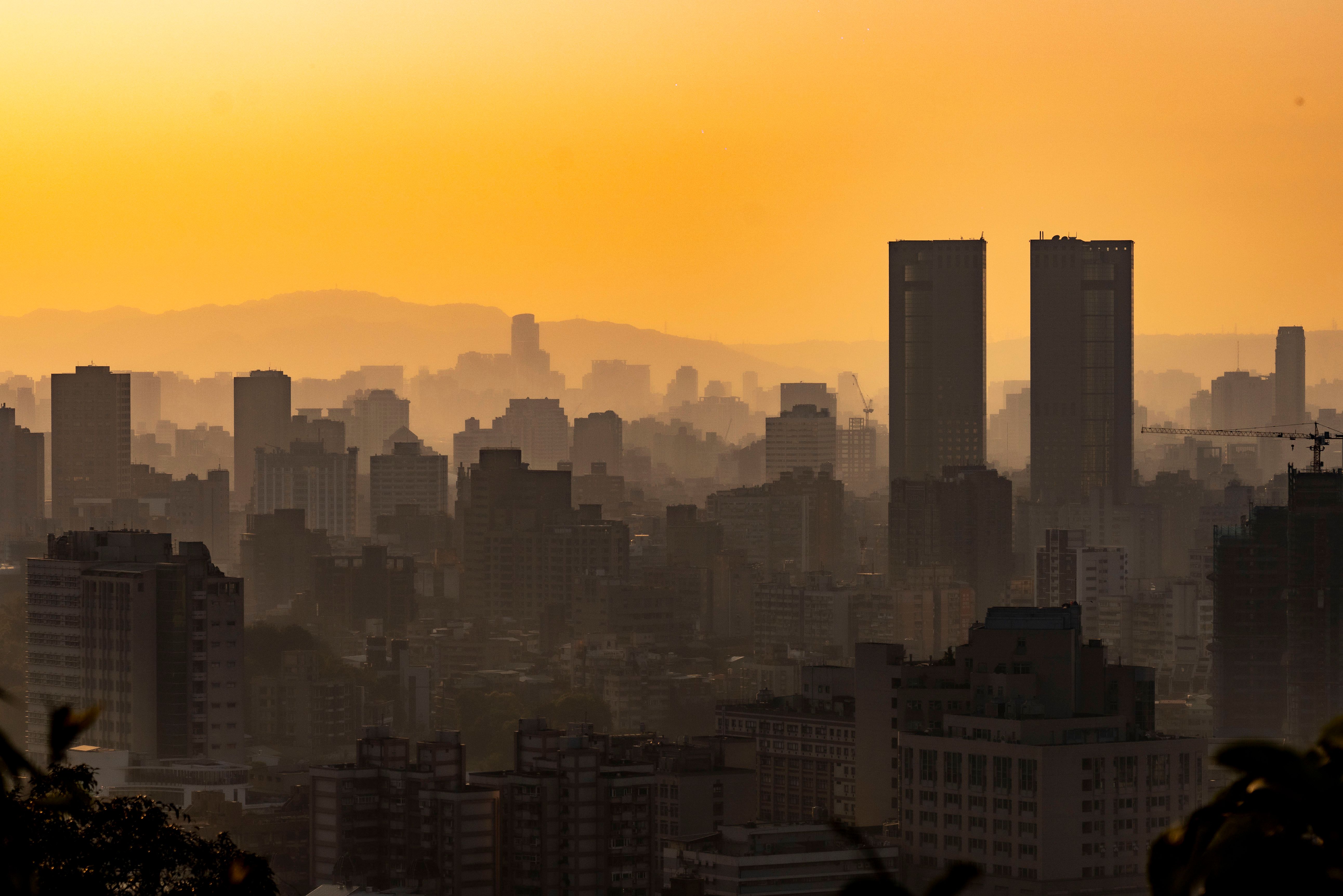 Yellow Sky over City at Sunset · Free Stock Photo
