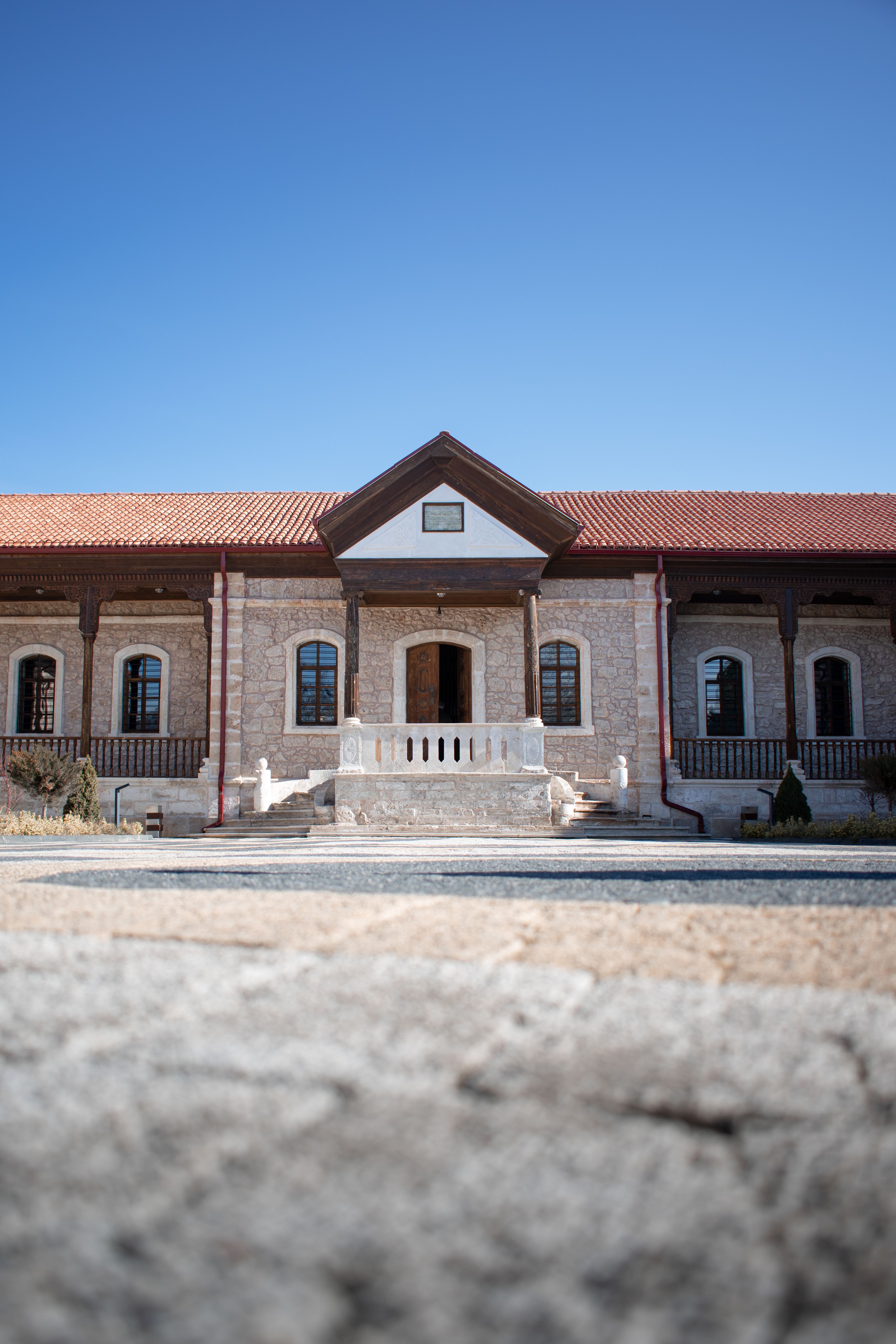 Blue Sky over Stone Building · Free Stock Photo