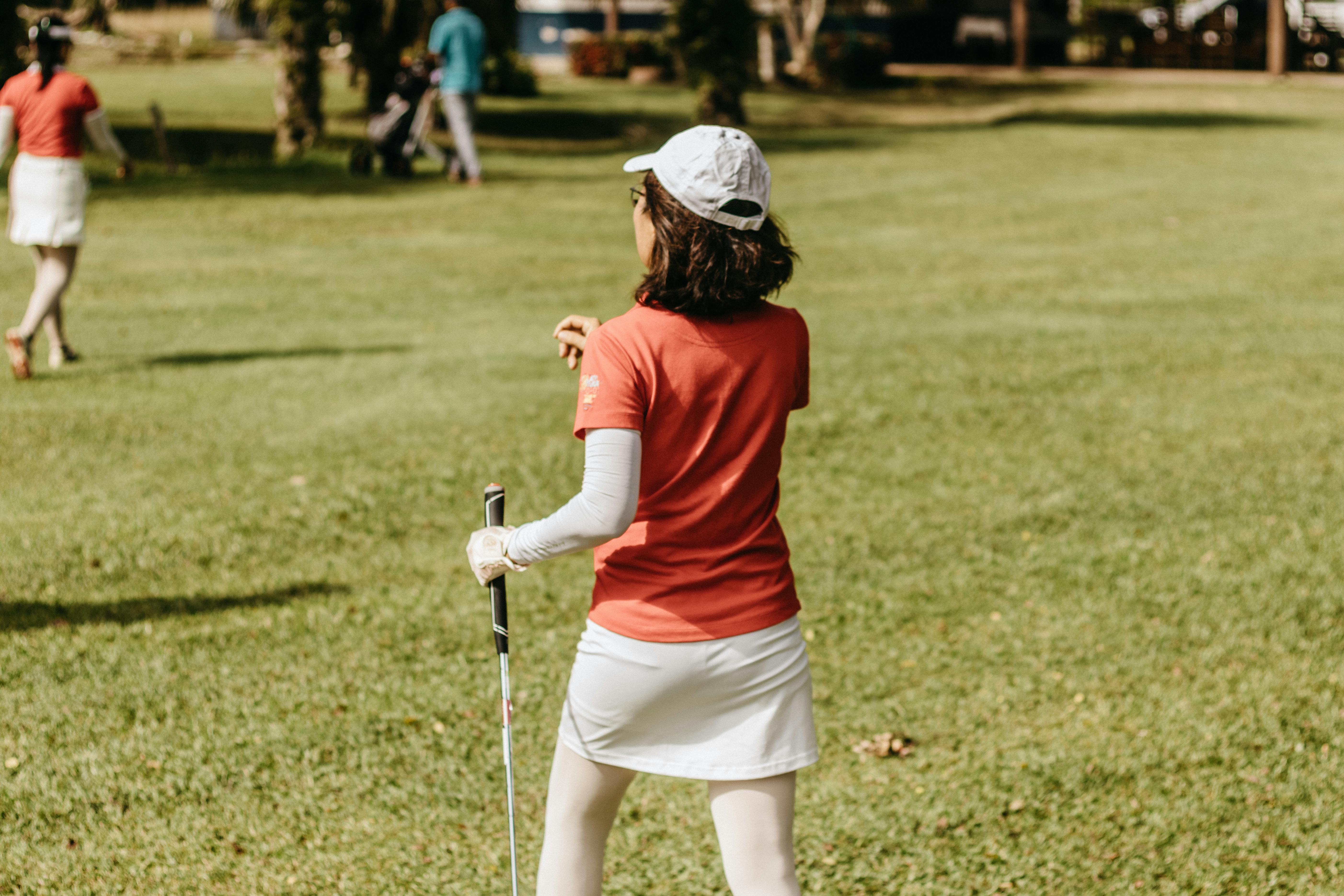 Back View of Woman Playing Golf · Free Stock Photo