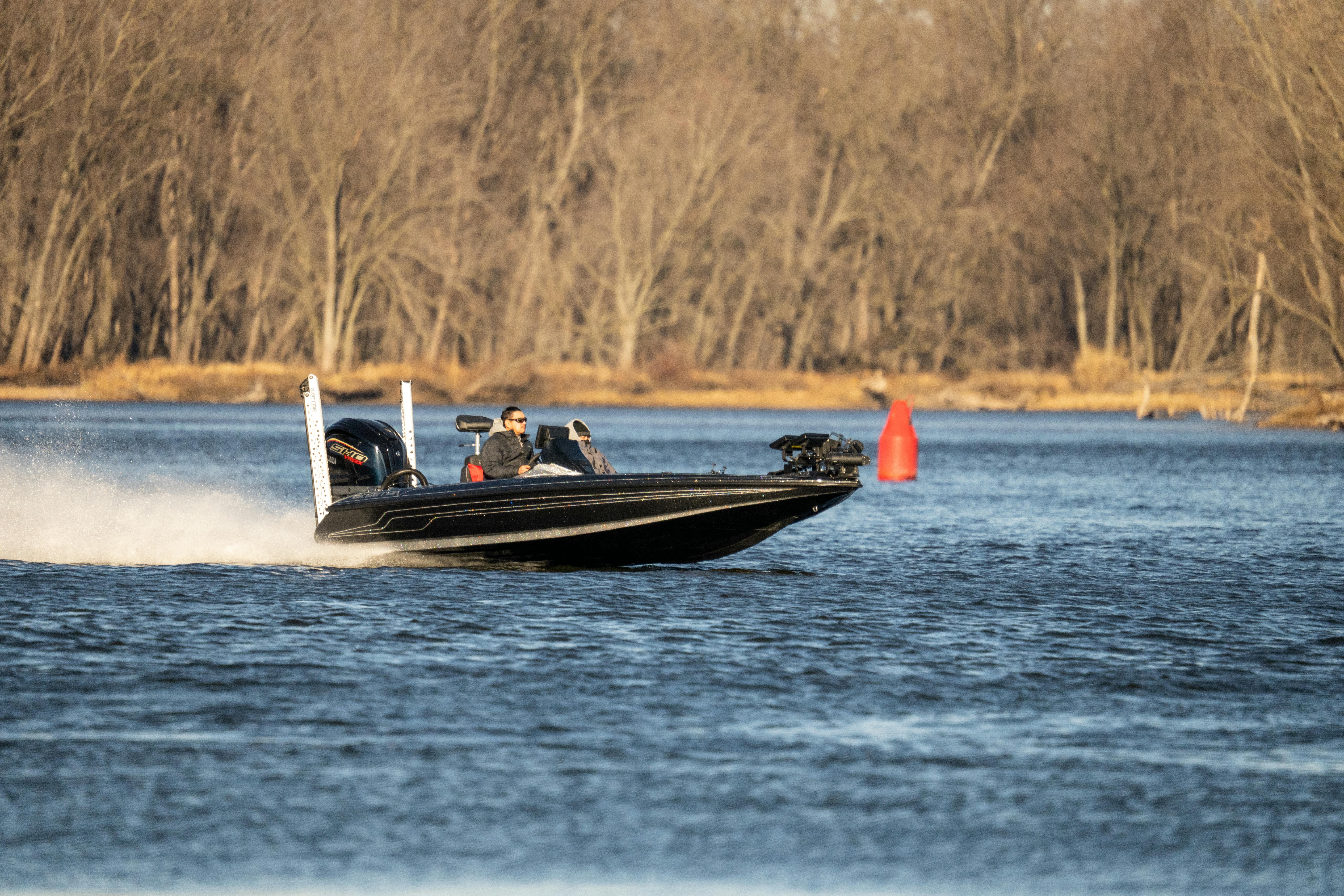 Person riding a Speedboat on a River · Free Stock Photo