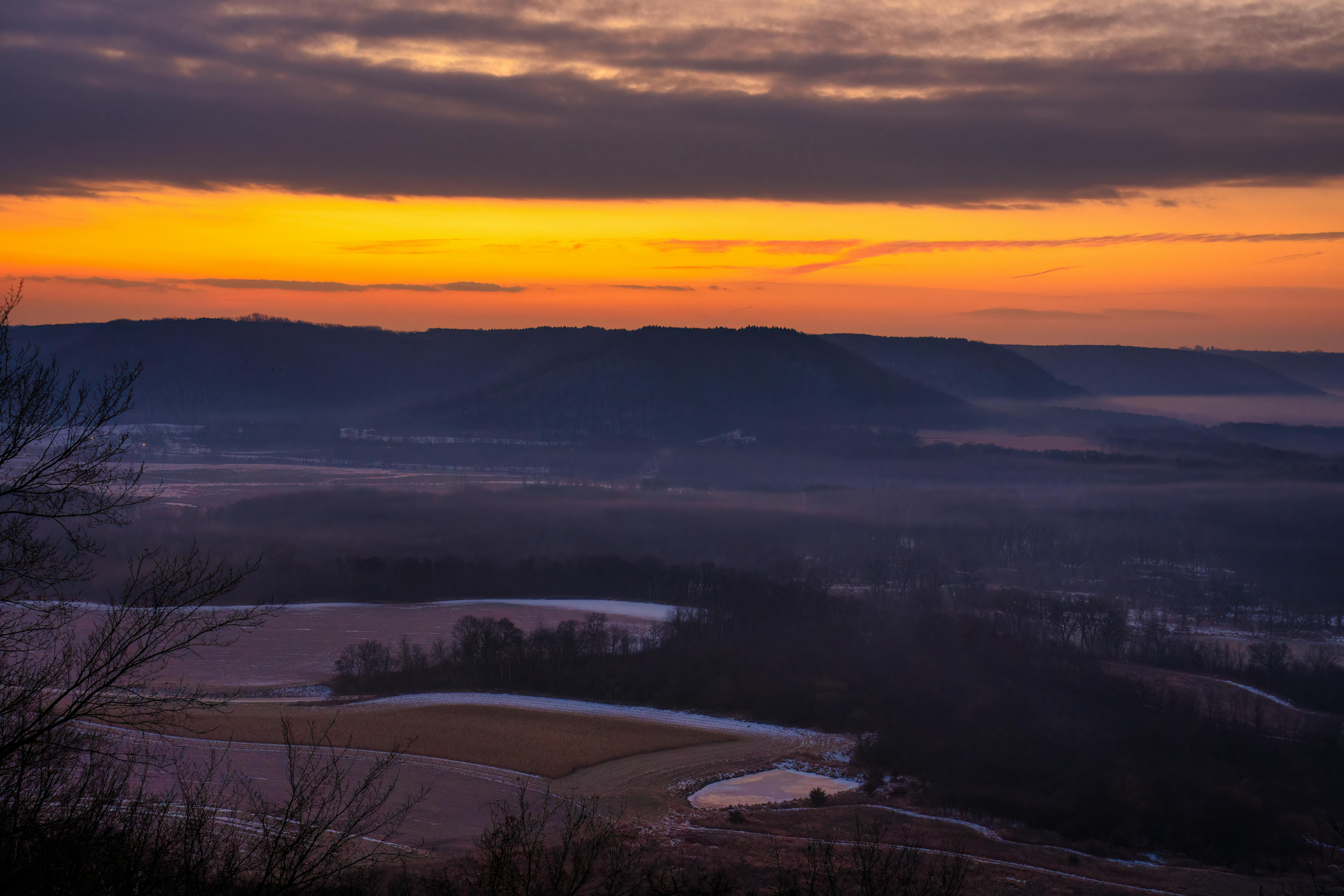 Clouds at Sunset over Valley · Free Stock Photo