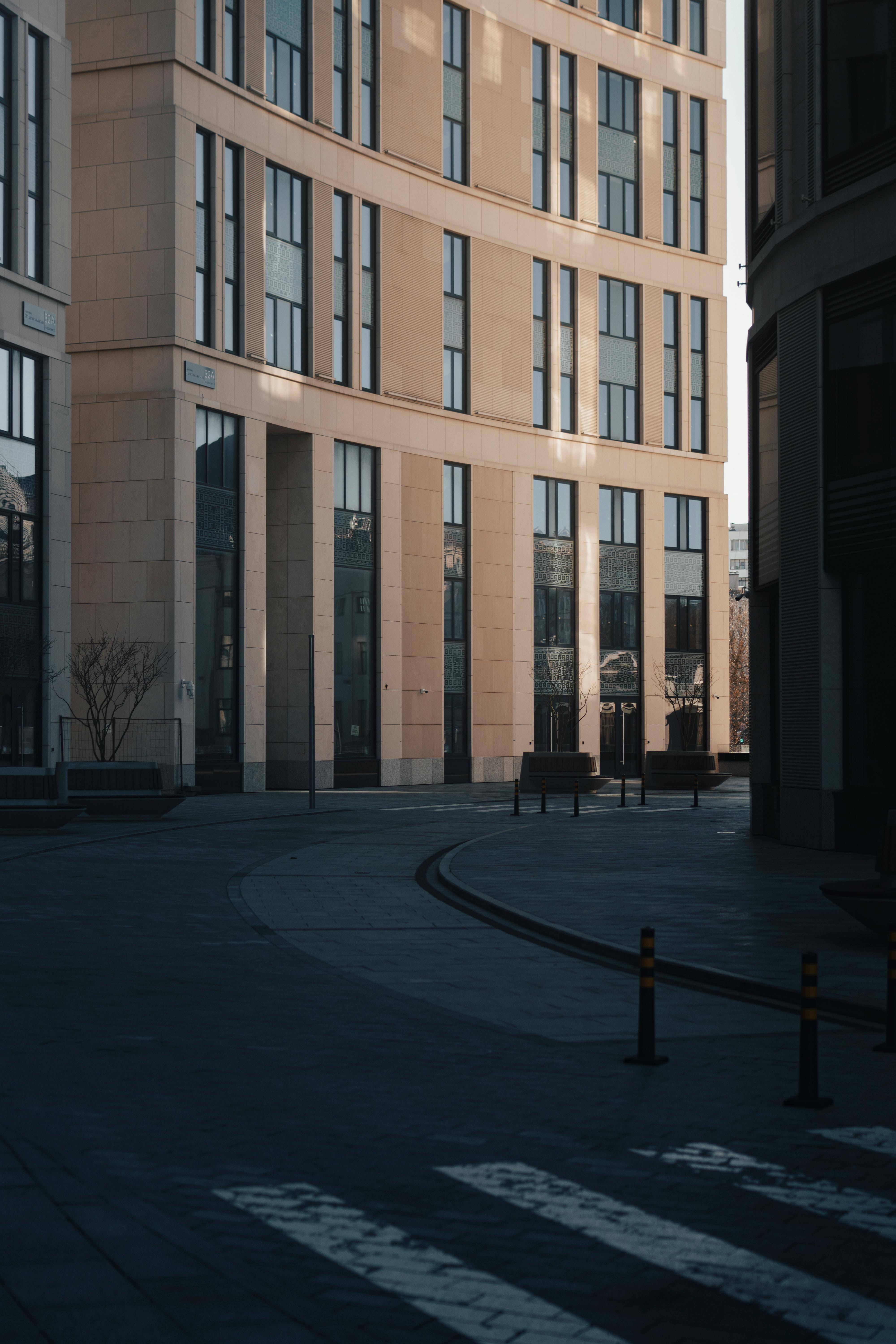 Empty Street and Facade of a Modern Building in City · Free Stock Photo
