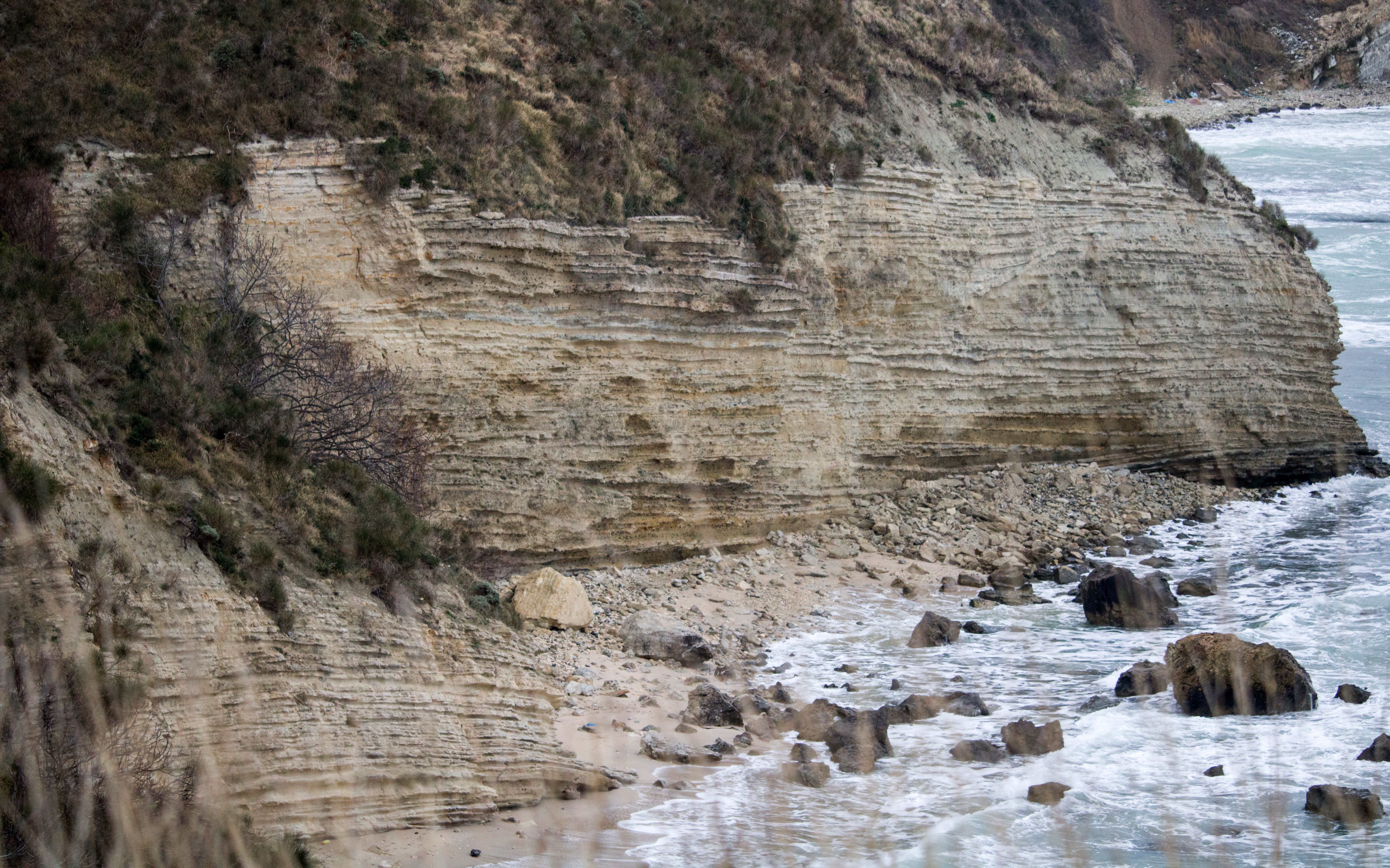 Photo of a Cliff by the Sea · Free Stock Photo