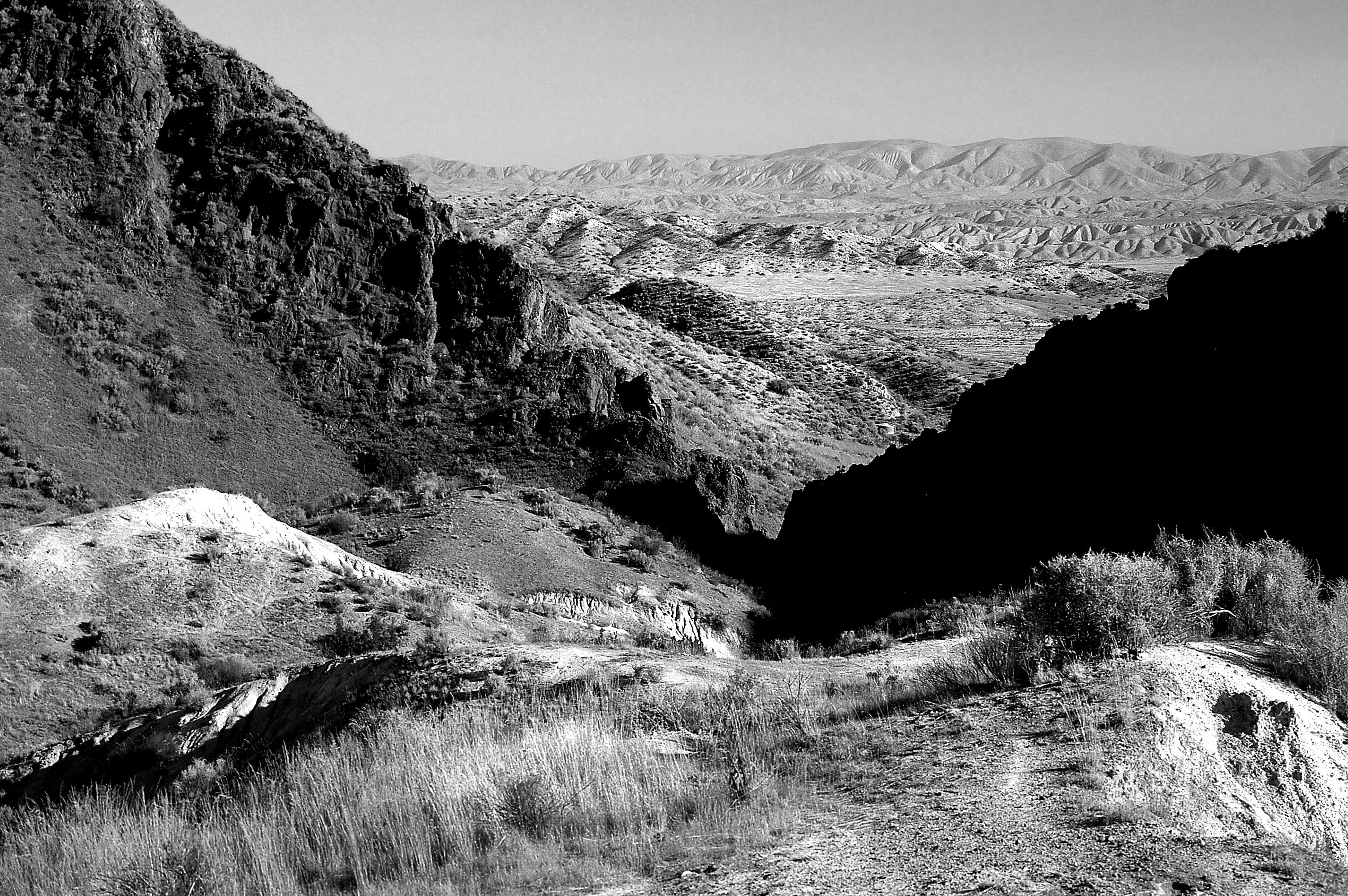 Grayscale Photo of Mountain Range · Free Stock Photo