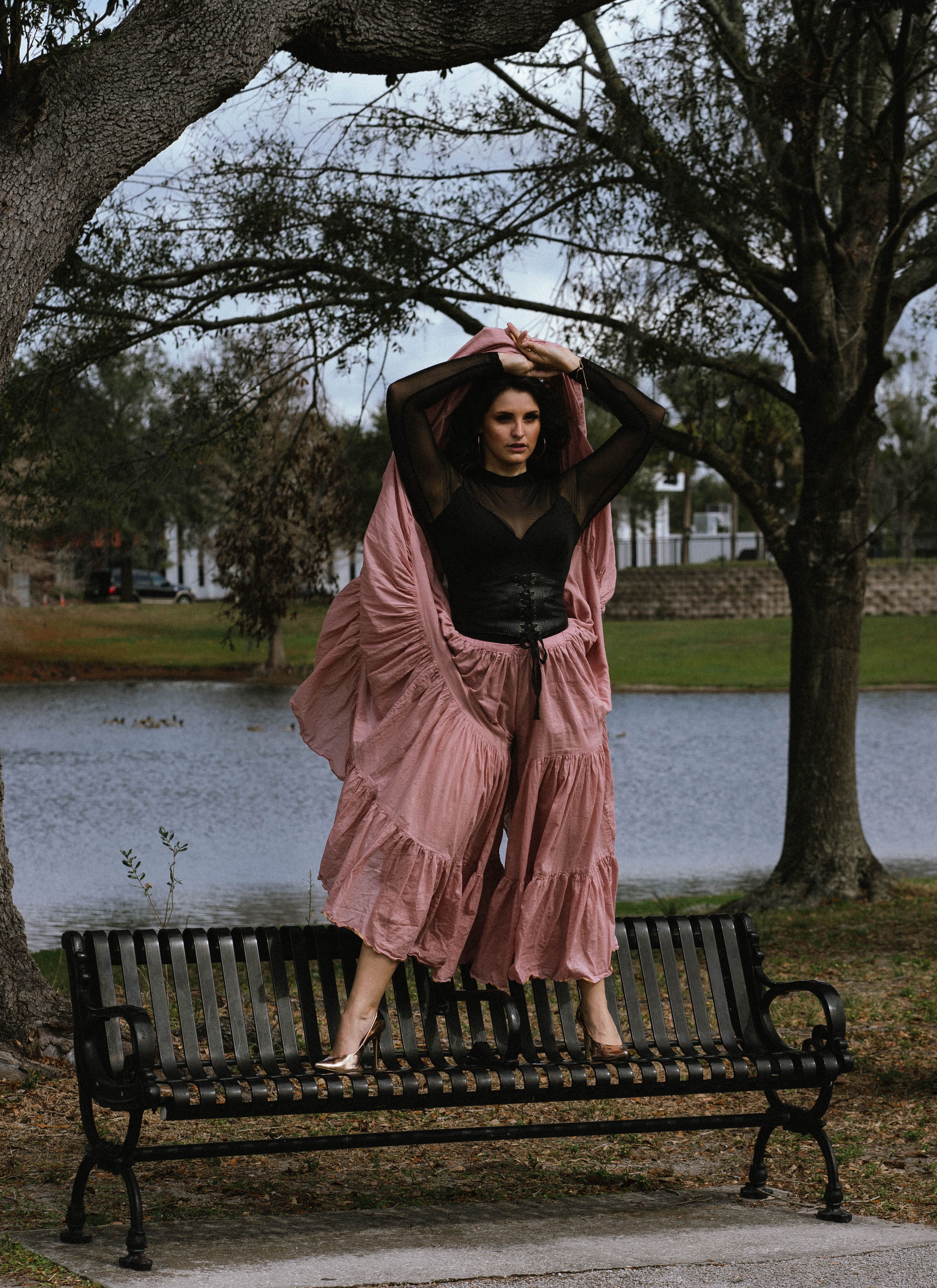 Woman Standing on a Bench · Free Stock Photo