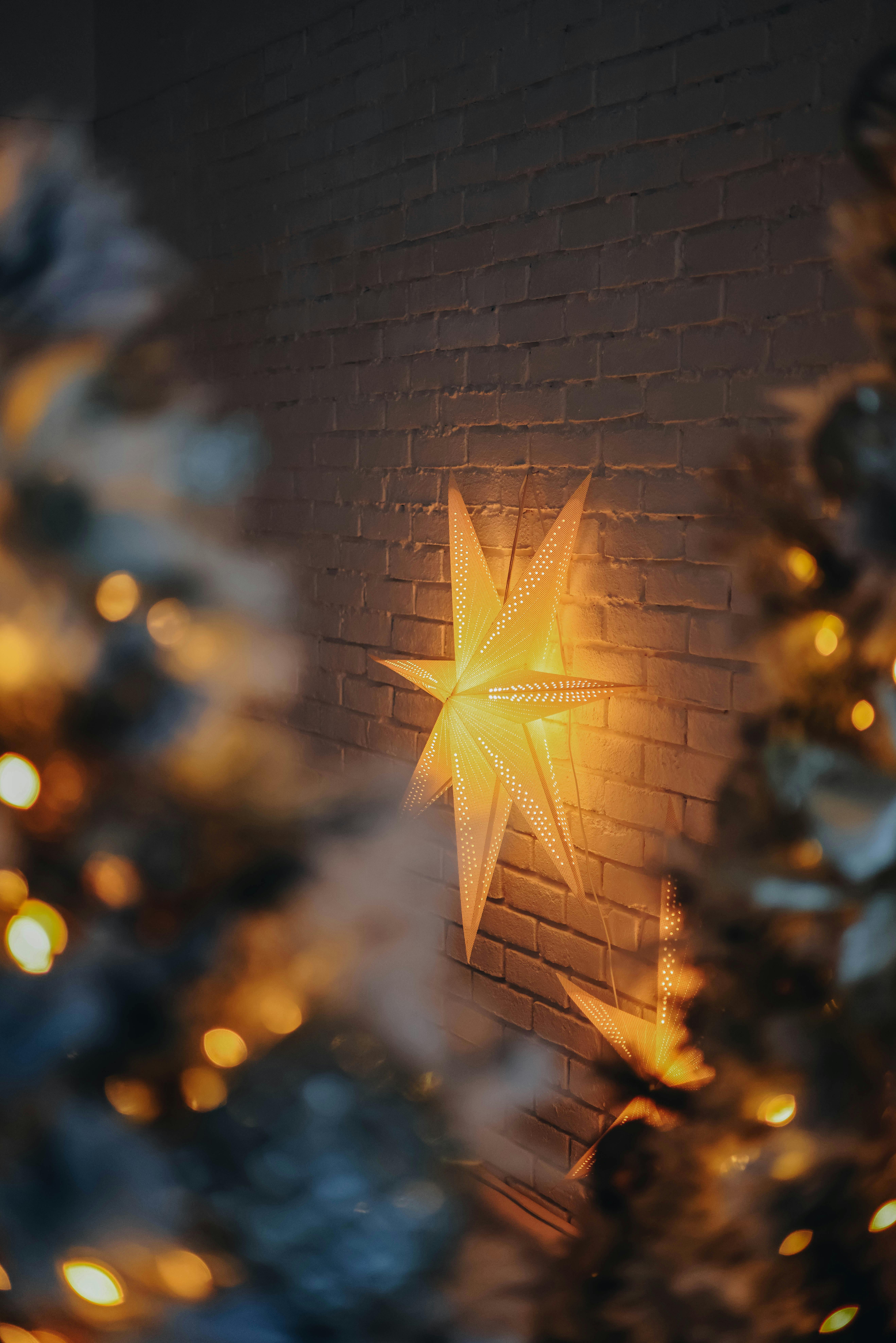 Illuminated Star on Wall · Free Stock Photo