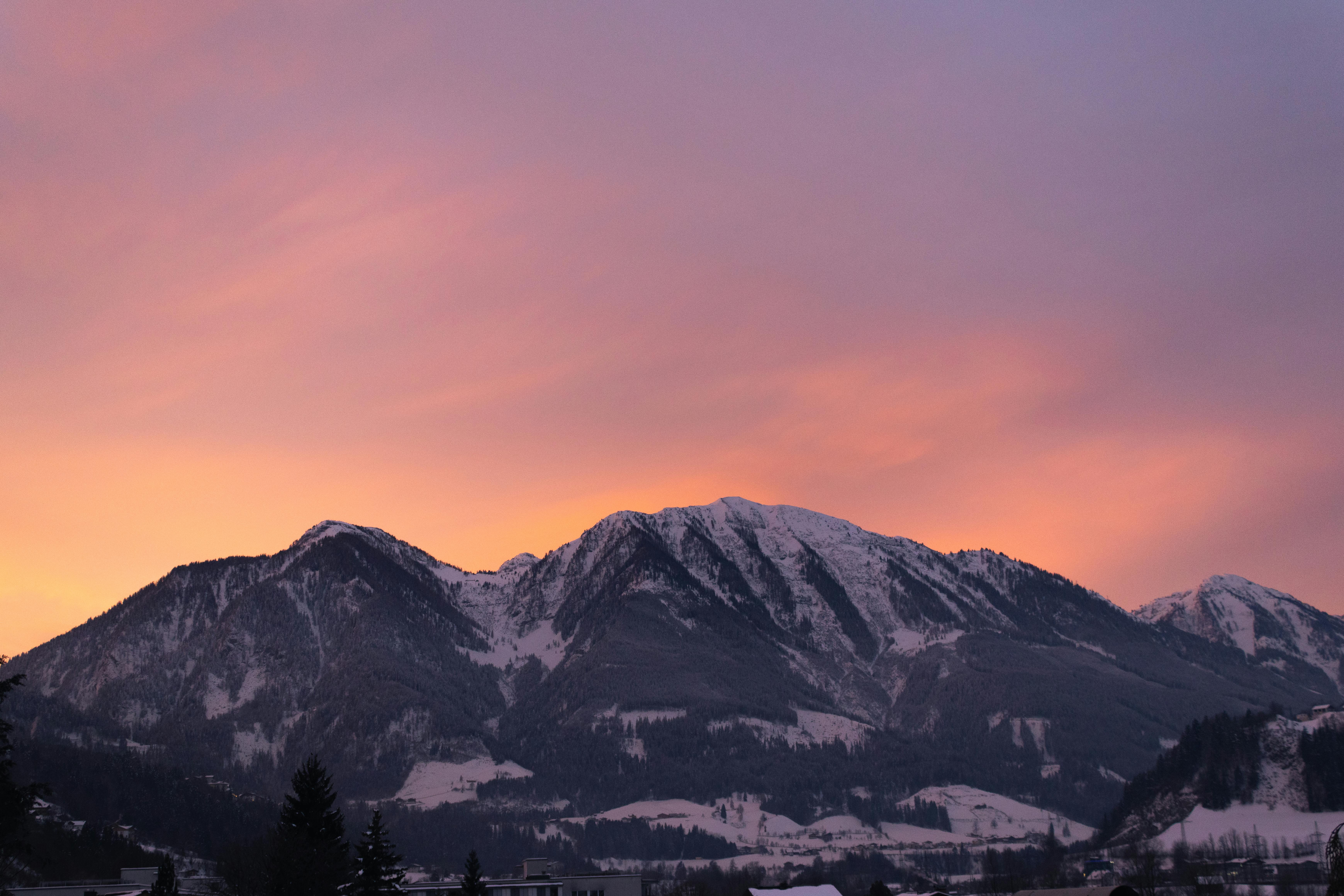 Mountain Range under Violet and Orange Sky · Free Stock Photo