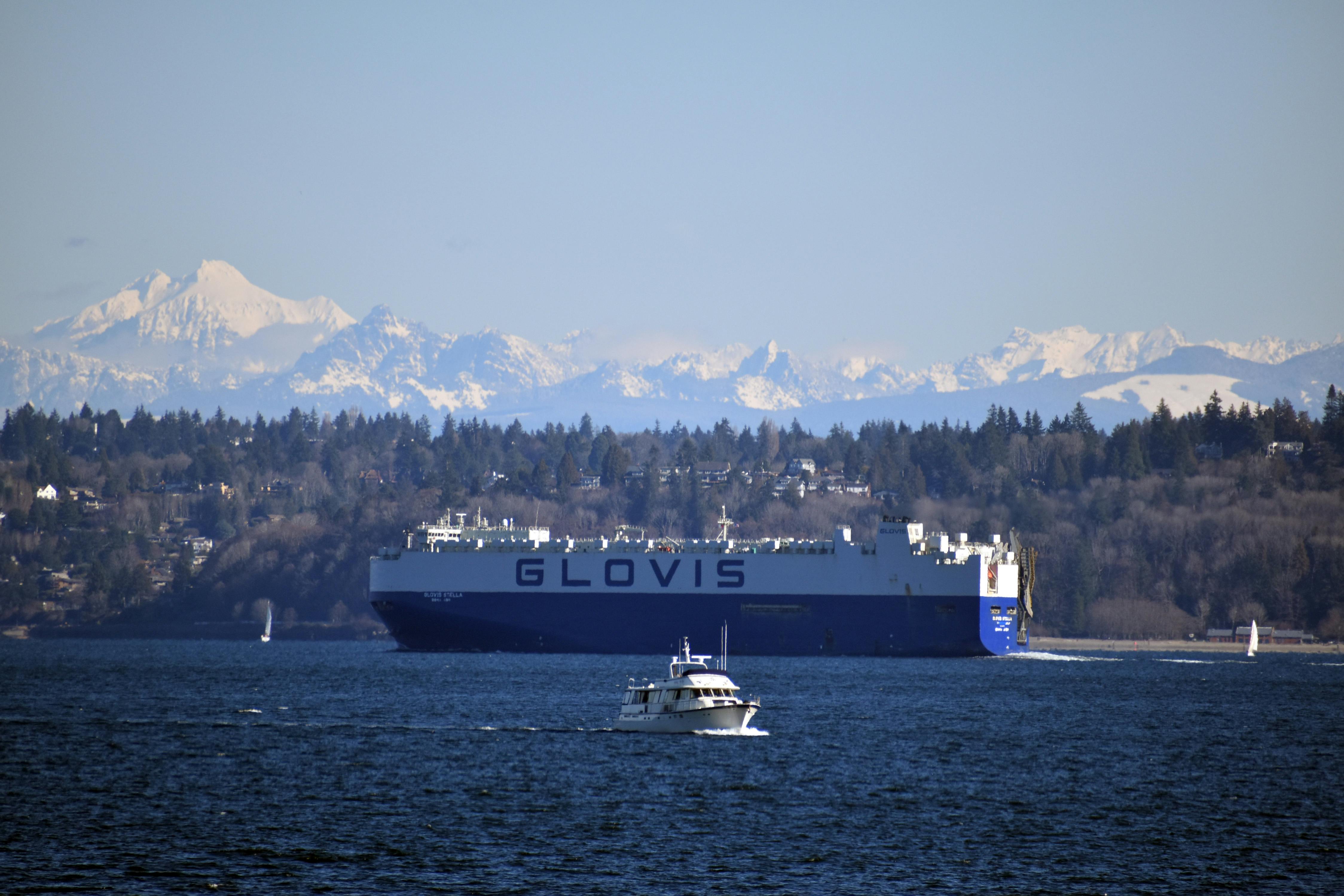 Directly Above a Fully Loaded Cargo Ship on a Sea · Free Stock Photo
