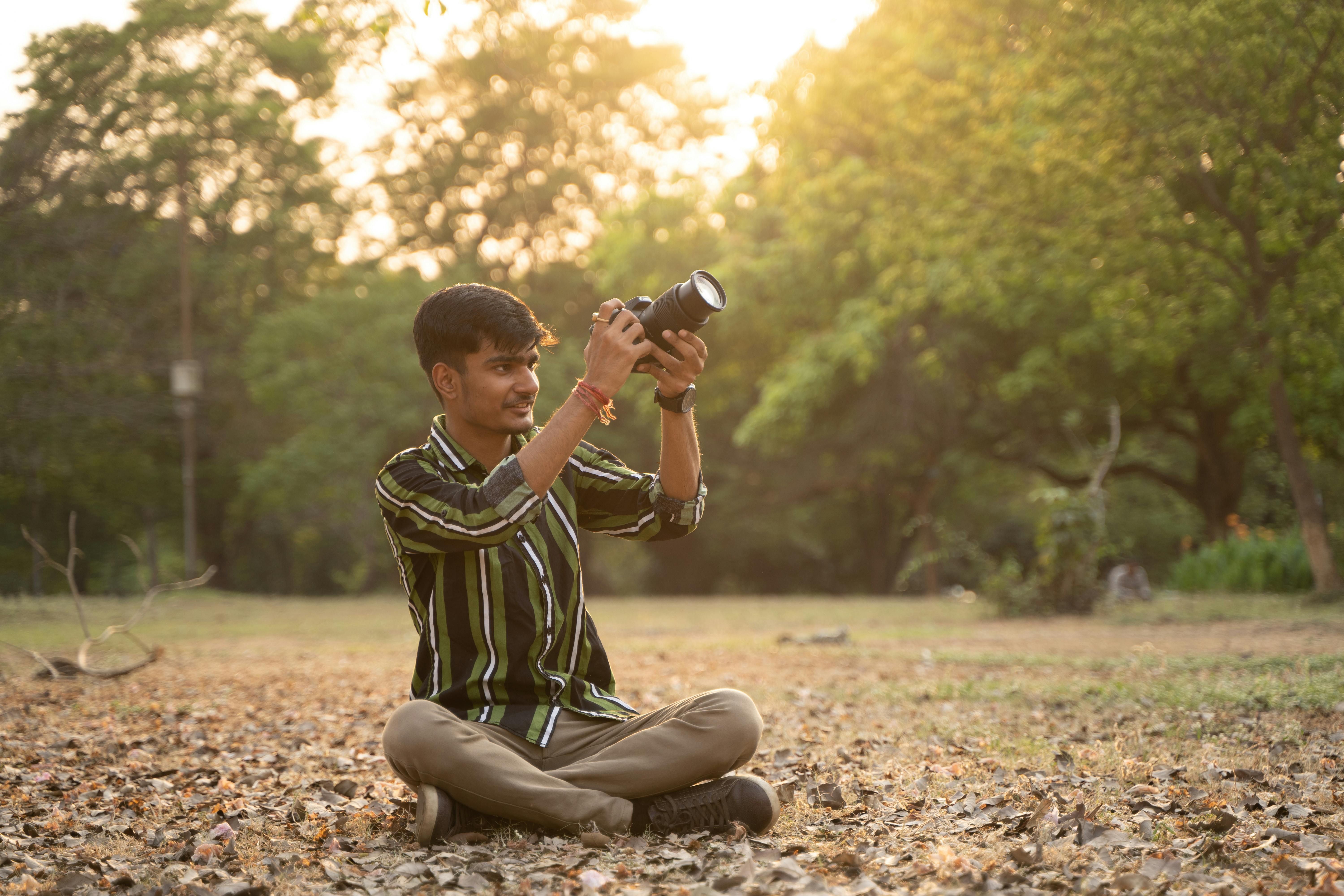 Person Holding Camera during Dayime · Free Stock Photo