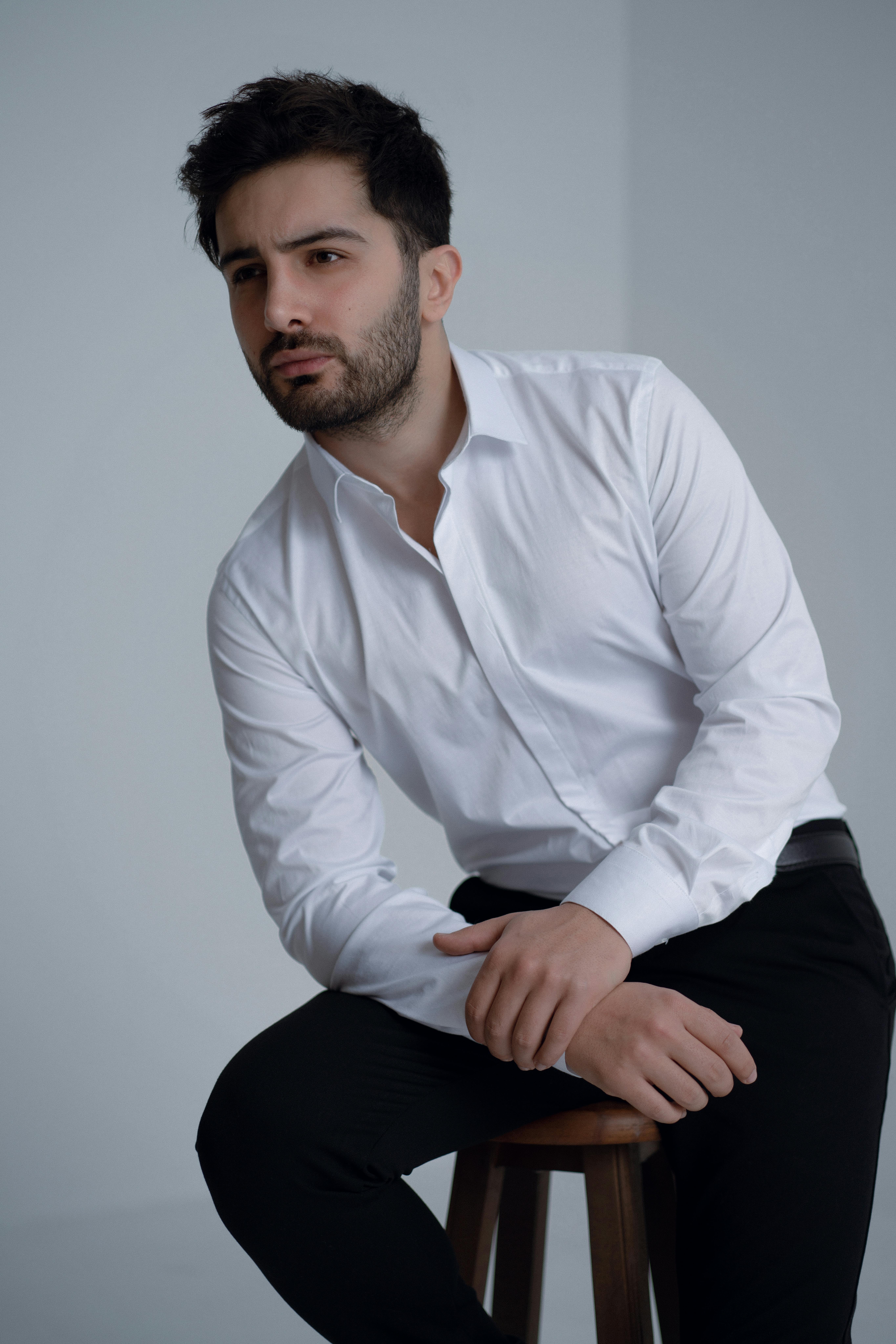 Portrait of a Man Sitting · Free Stock Photo