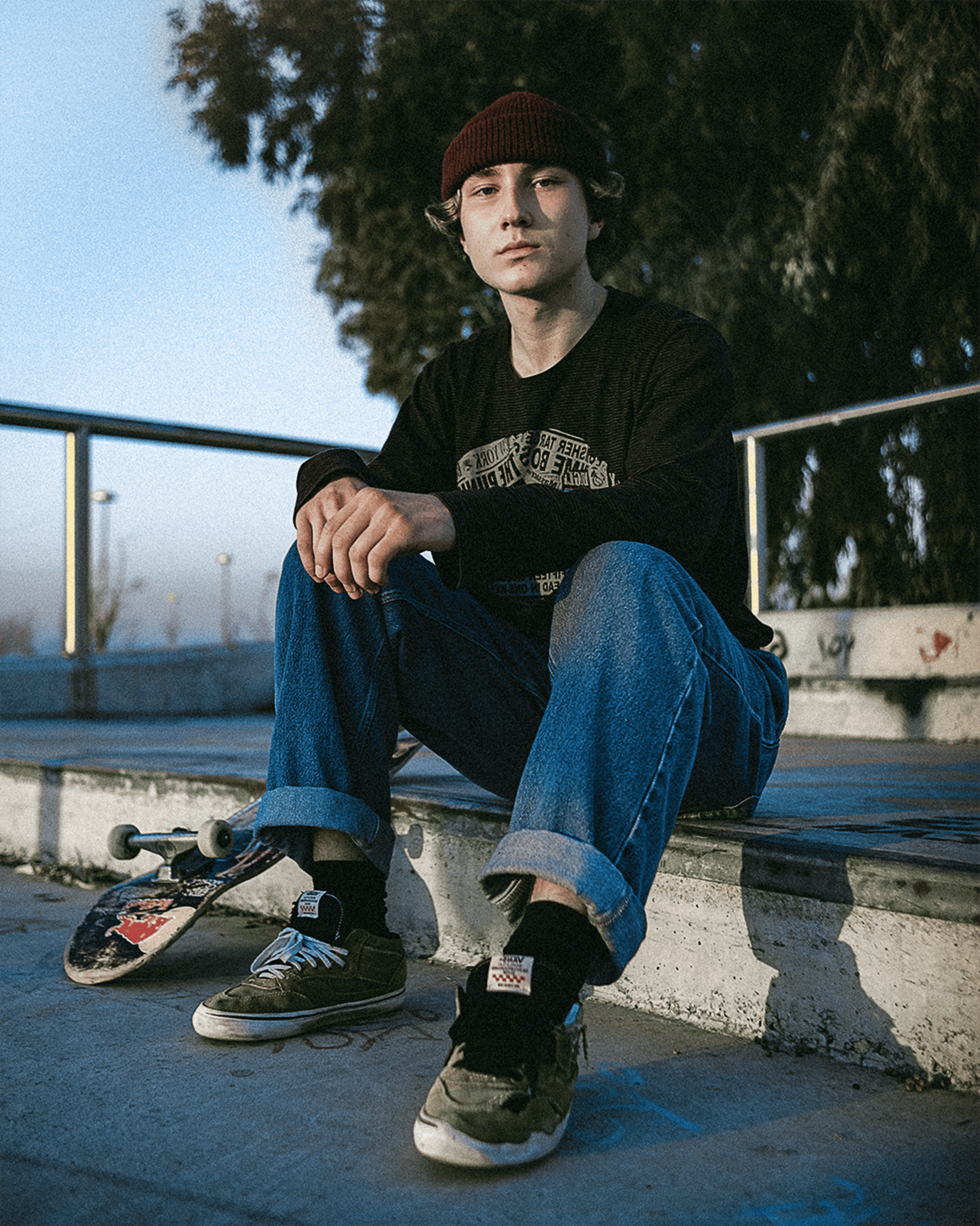 Man Posing with Skateboard · Free Stock Photo