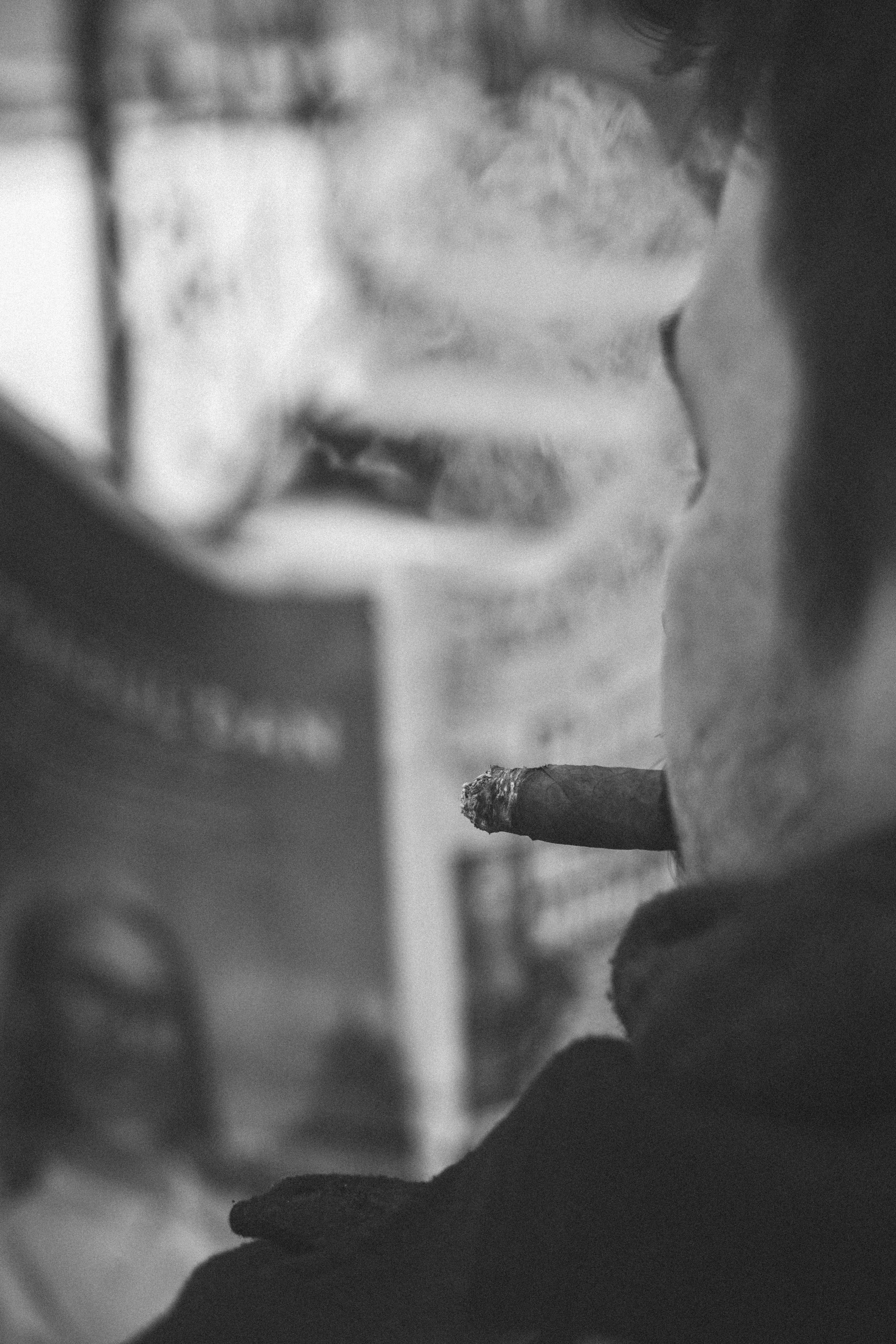 Gray Scale Photo of Human Smoking Inside the Room · Free Stock Photo