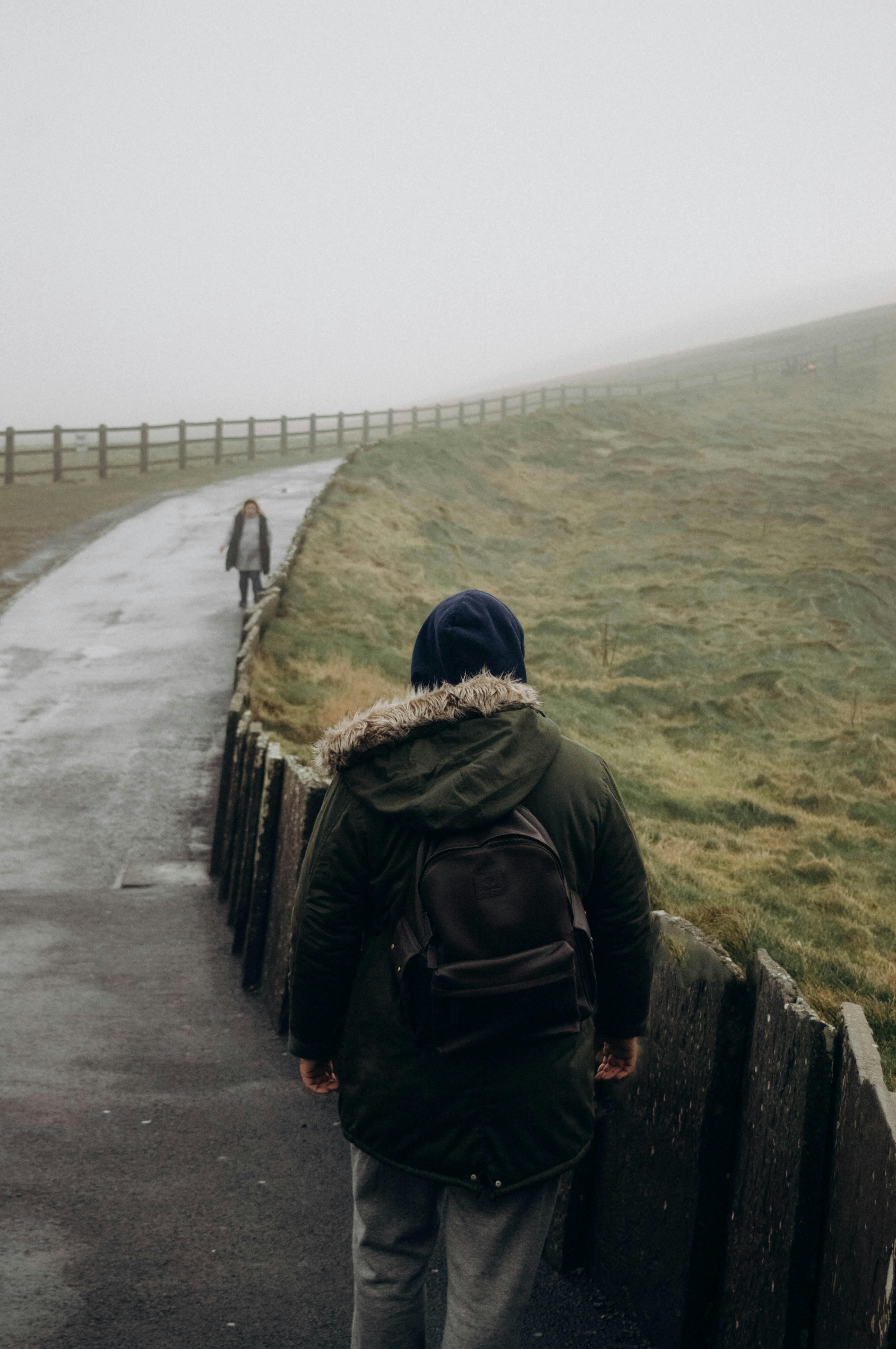 Photo of a Man Walking on a Path in Nature · Free Stock Photo