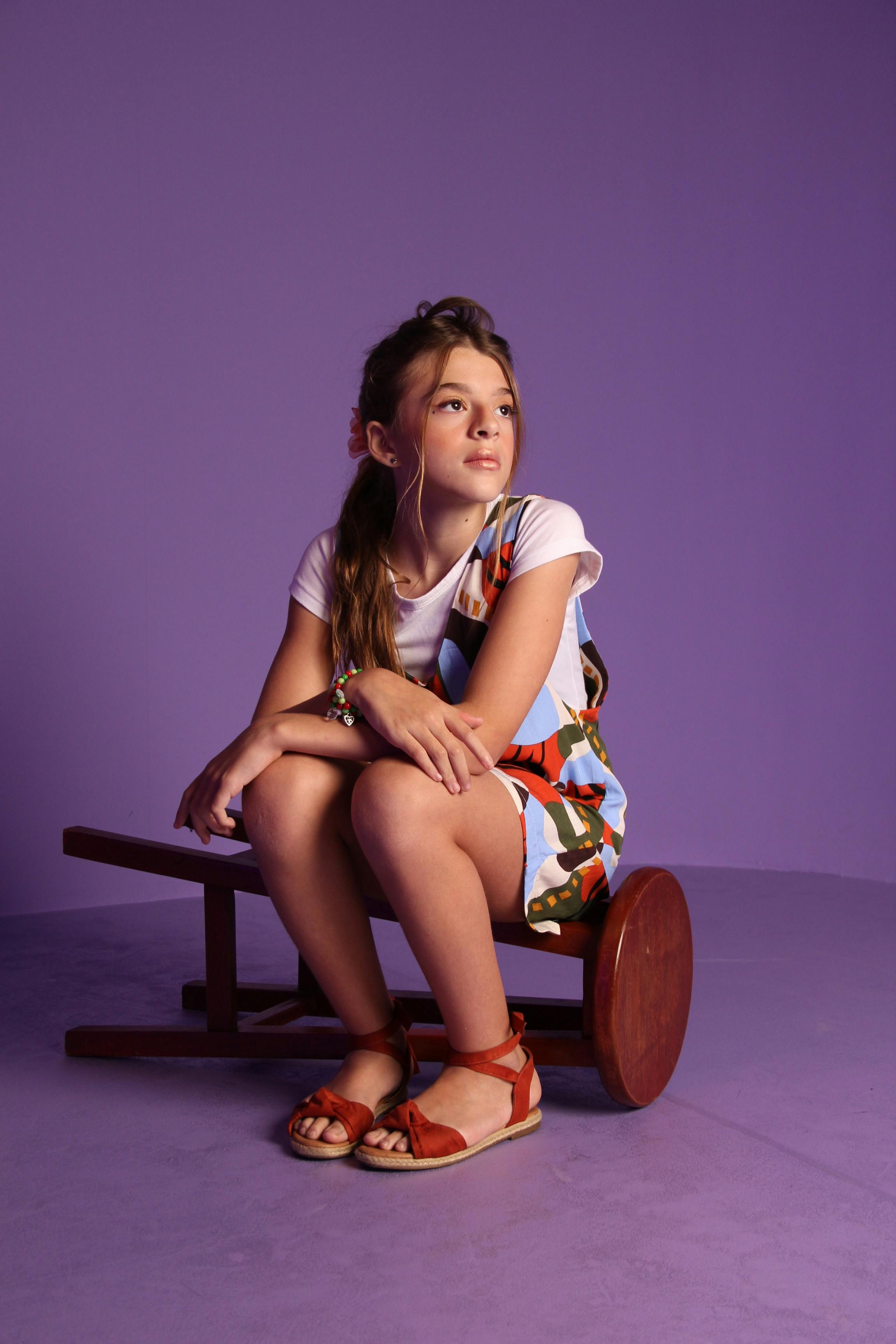 Photo of a Sitting Teenage Girl · Free Stock Photo