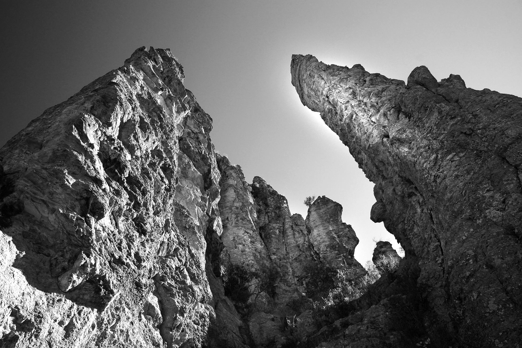 Gray Scale Image of Stone Tower · Free Stock Photo
